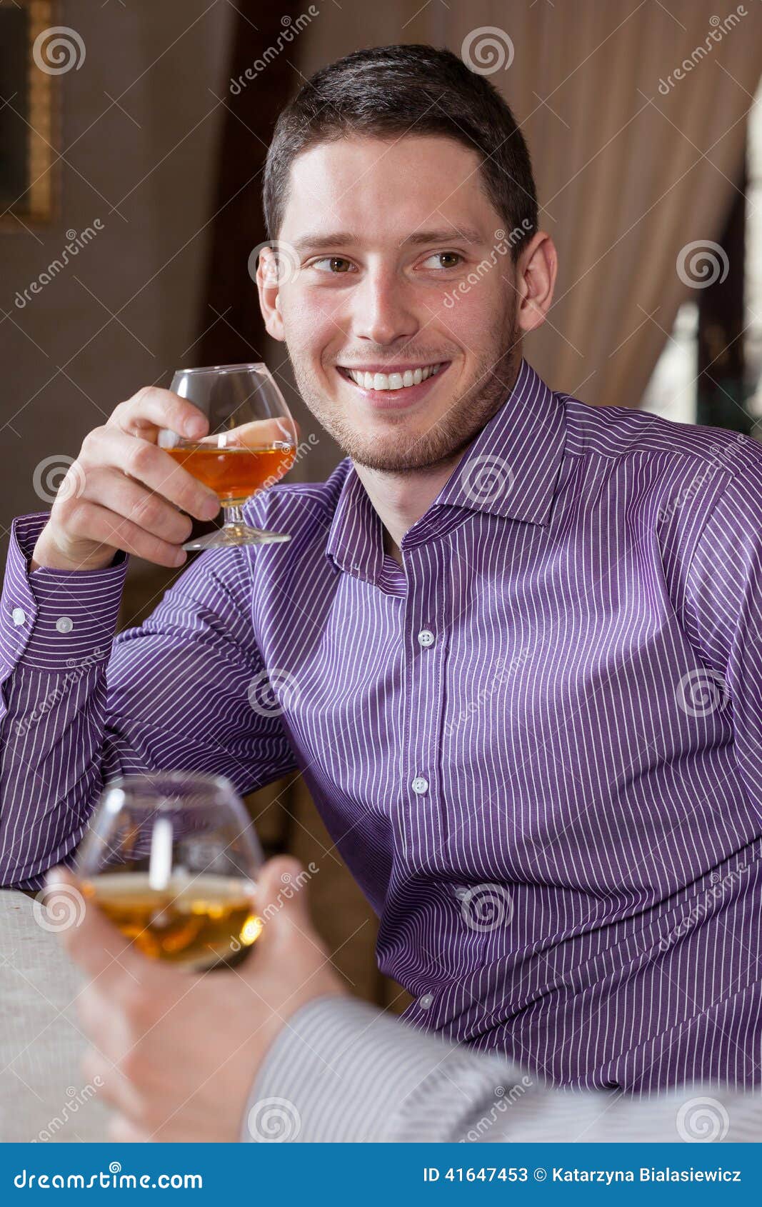 Man Drinking Cognac with Friend Stock Image - Image of dinner, friends ...