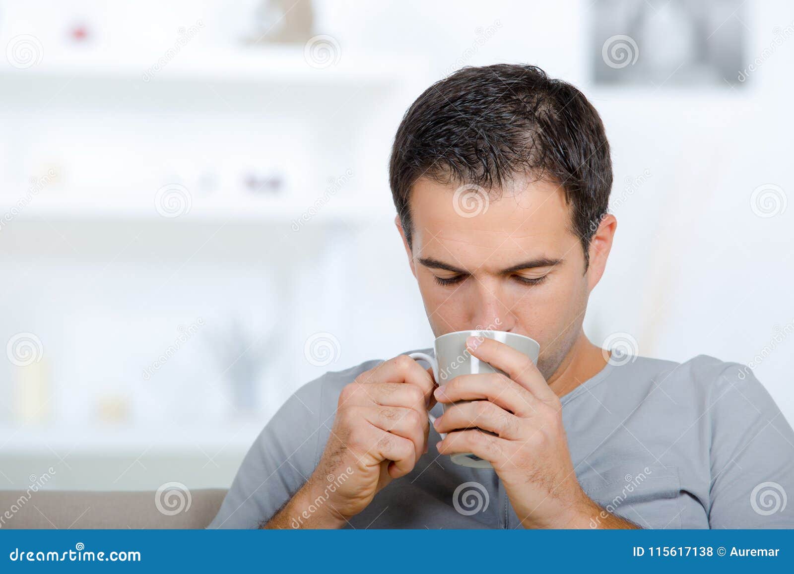 Man drinking from cup stock photo. Image of beverage - 115617138