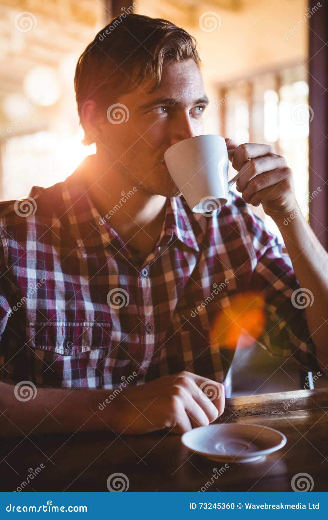 Man Drinking a Cup of Coffee Stock Photo - Image of hotel, male: 73245360
