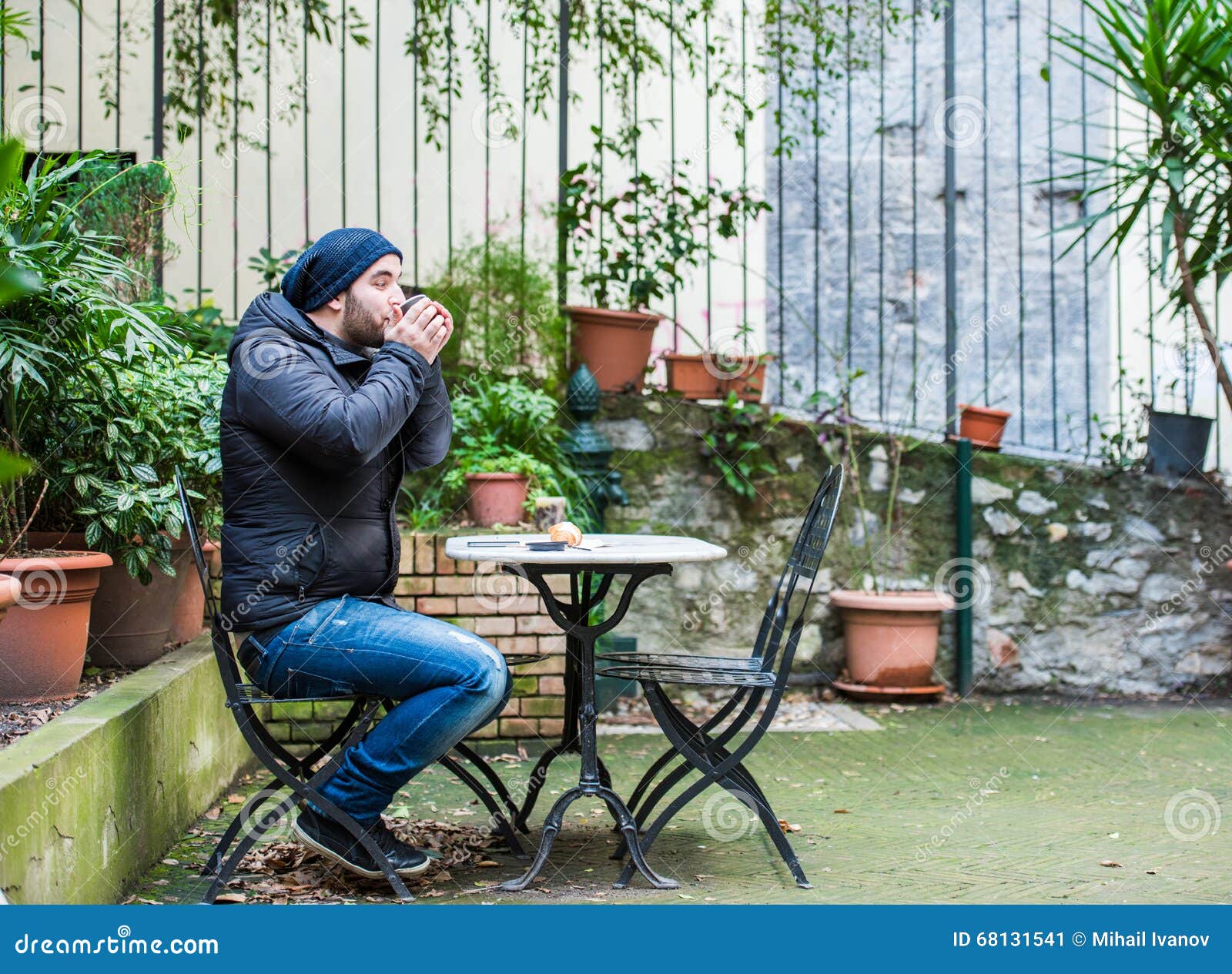 Man Drinking from a Cup in a Garden Stock Image - Image of lunch ...