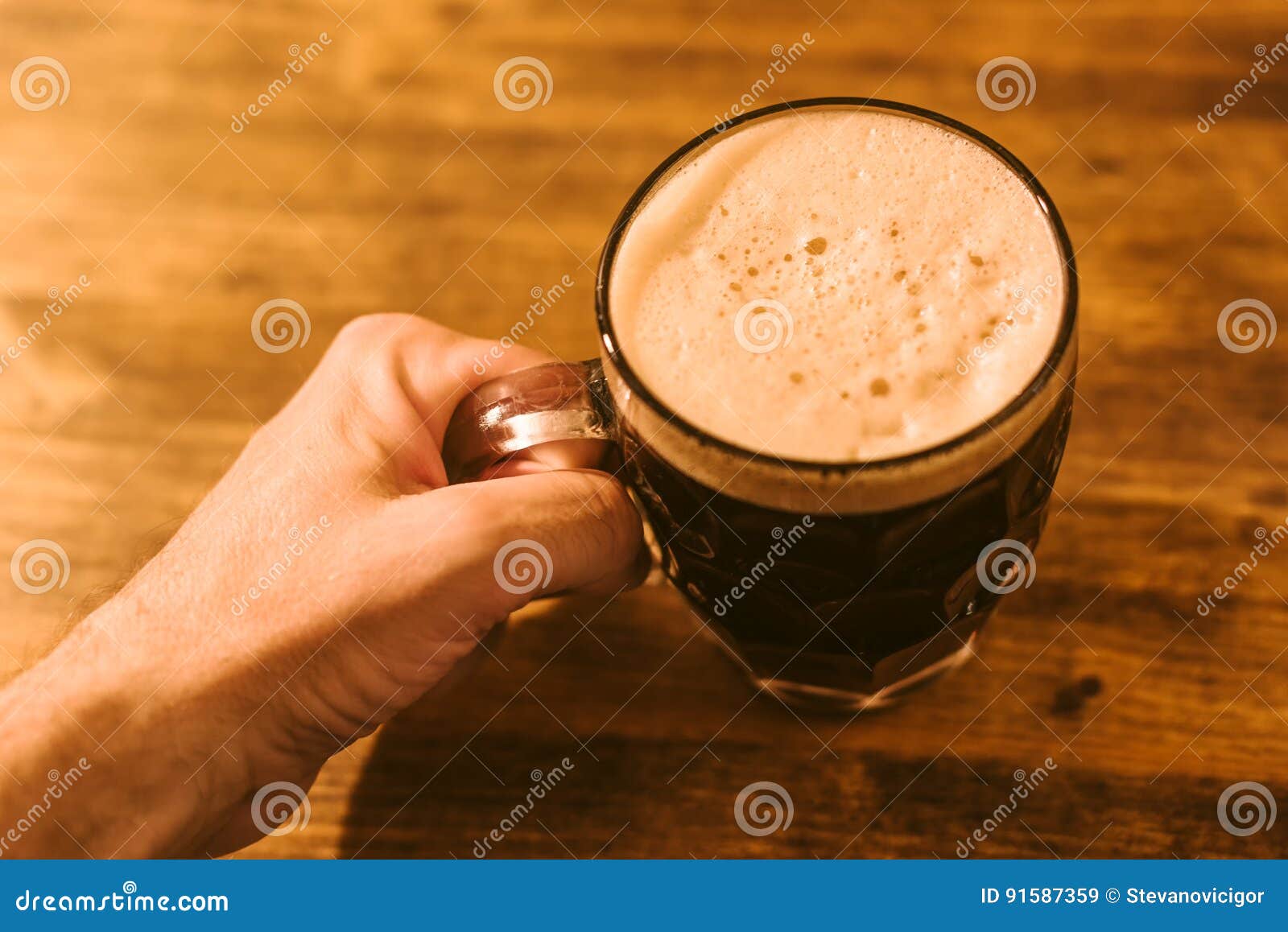 Man Drinking Dark Beer in British Dimpled Glass Pint Mug Stock Image ...