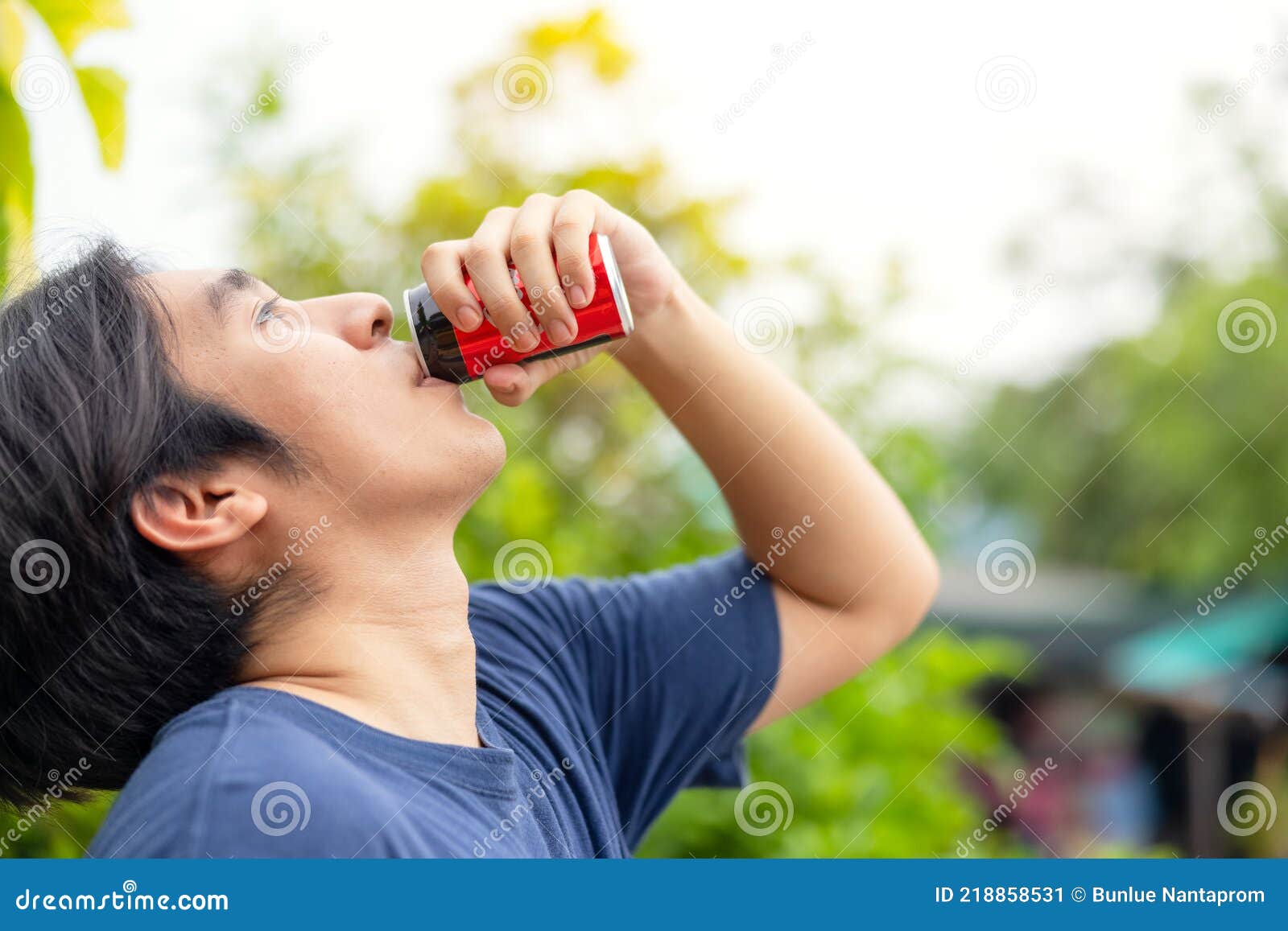 A Man Drinking the Famous Beverage Cola from Can Stock Image - Image of ...