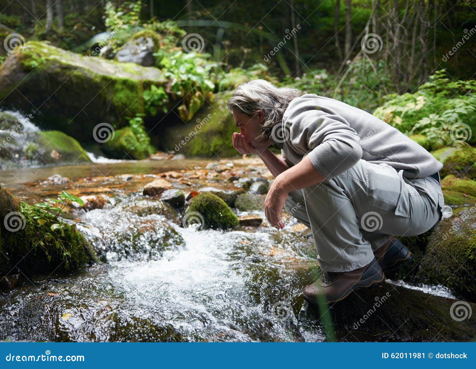 Man Drinking Fresh Water from Spring Stock Image - Image of landscape ...