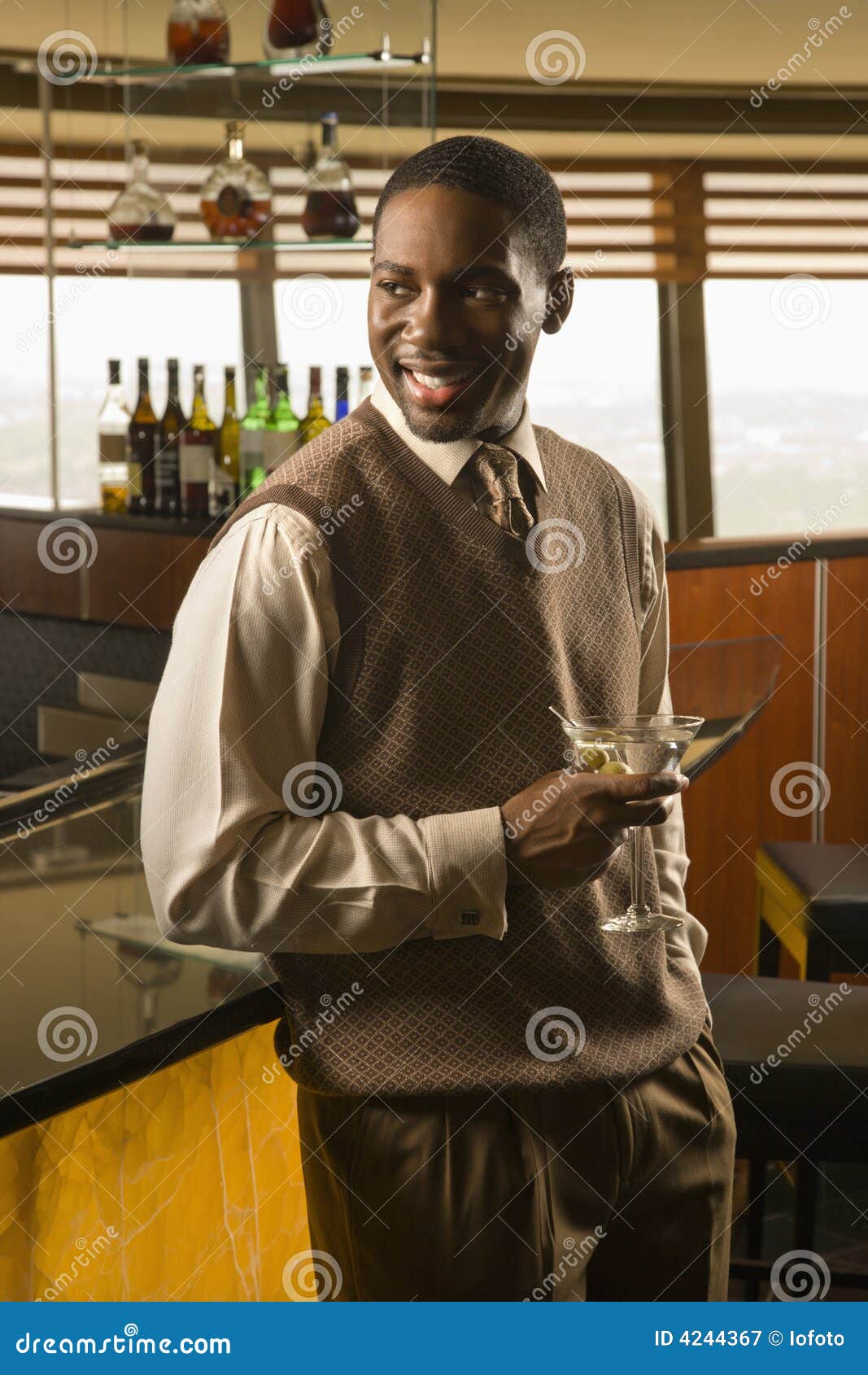 Man drinking martini. stock image. Image of person, alcoholic - 4244367