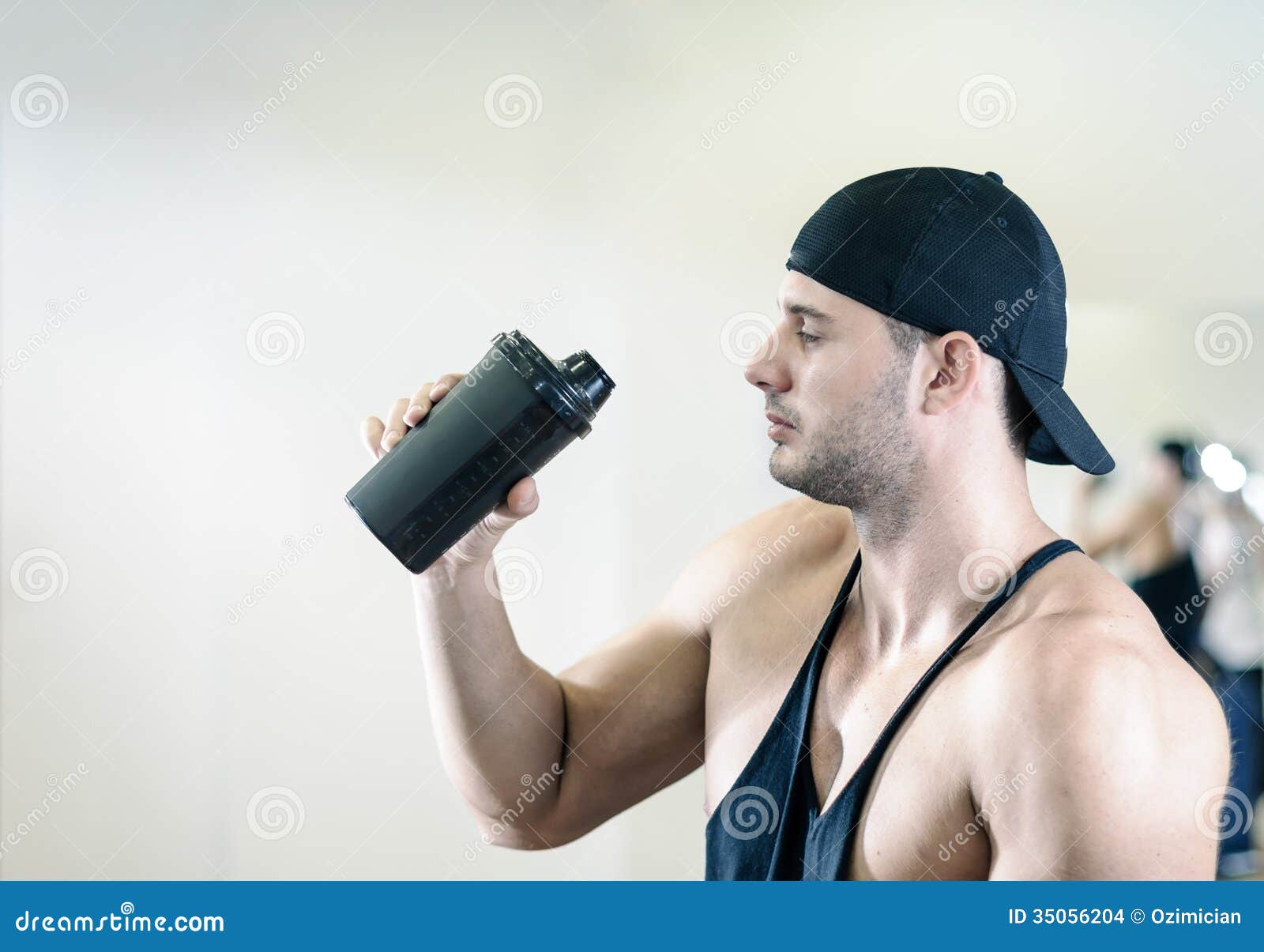 Man drinking shake in gym stock photo. Image of macho - 35056204