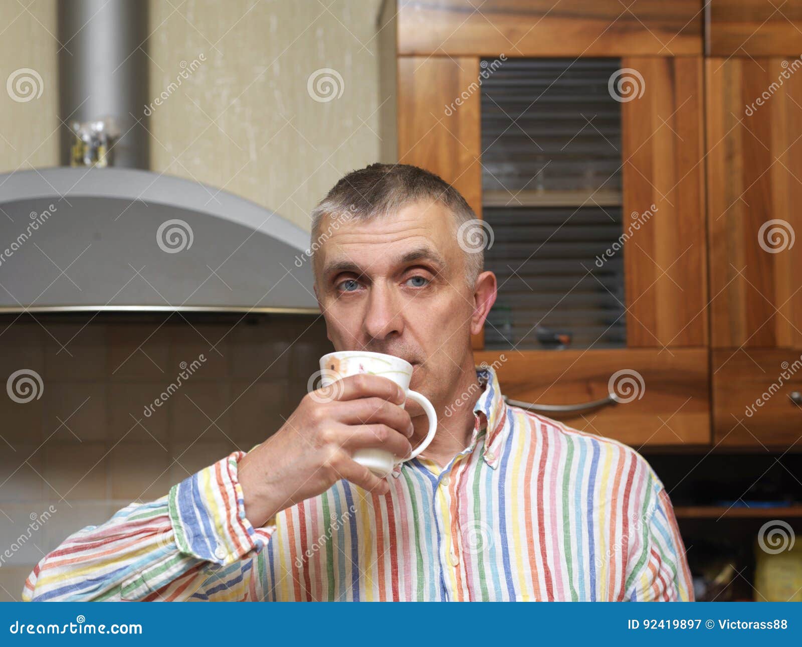 Man Drinking Tea stock image. Image of portrait, focus - 92419897
