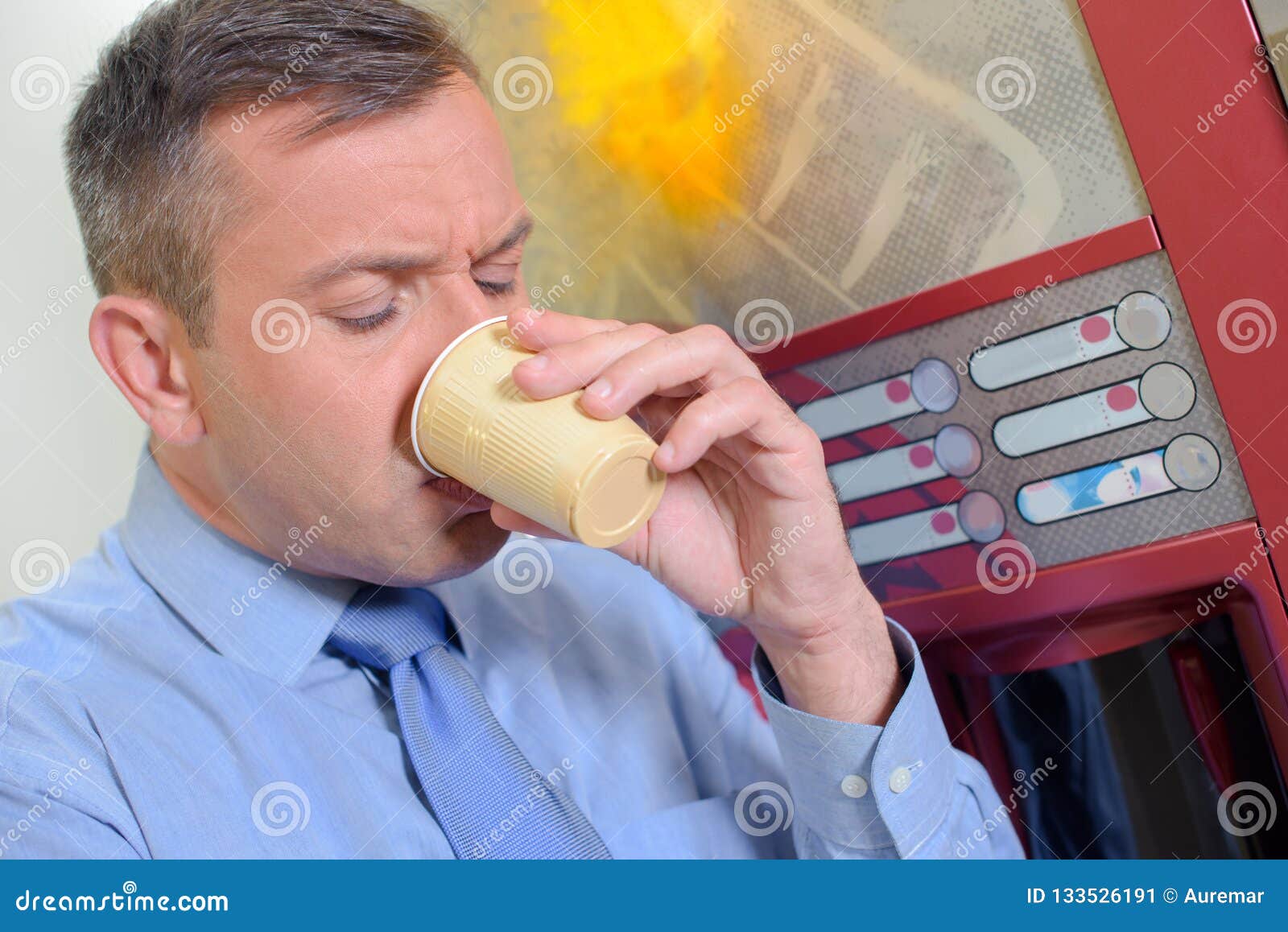 Man Drinking at Vending Machine Stock Image - Image of espresso ...