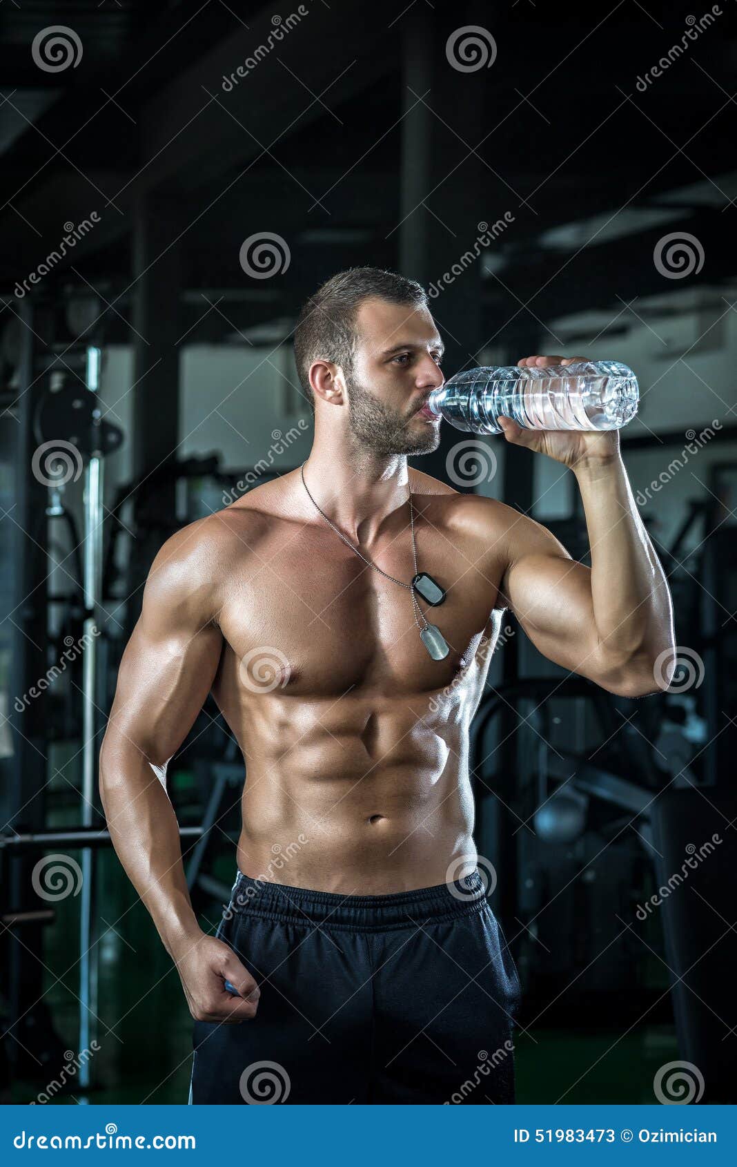 Man drinking water in gym stock image. Image of bodybuilding - 51983473