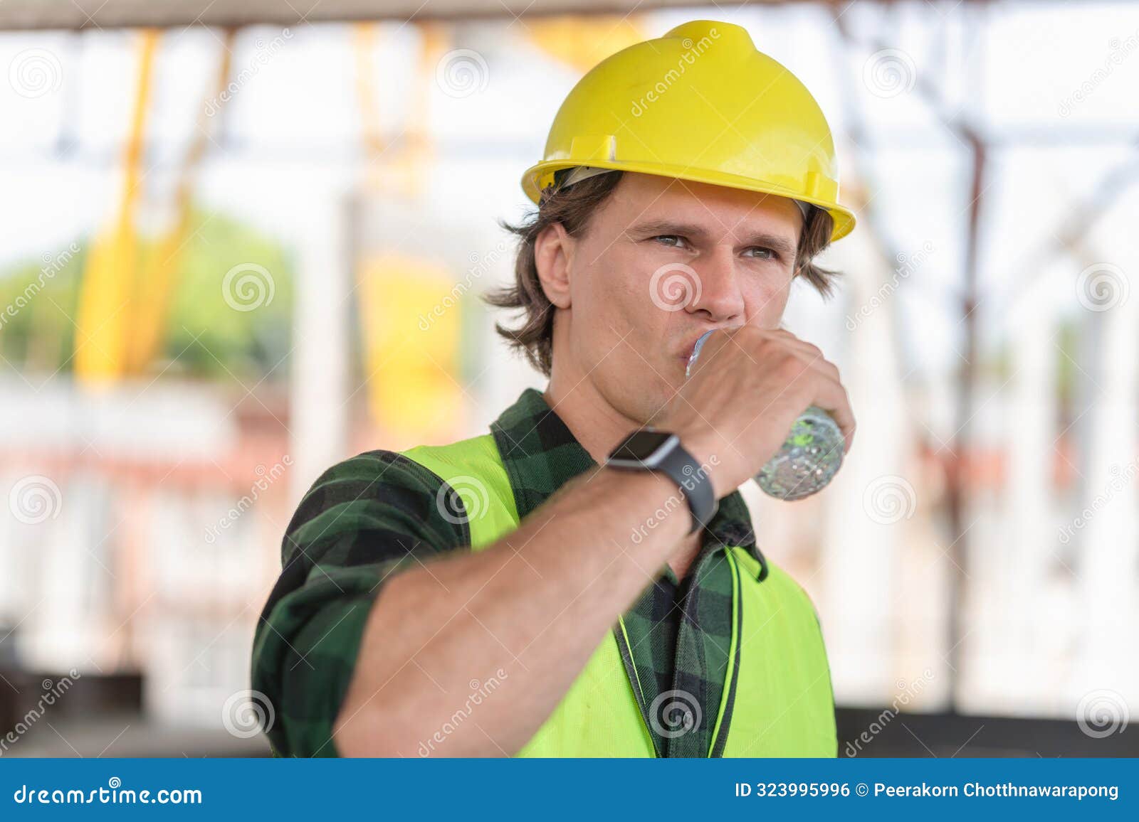 Man Drinking Water at the Precast Factory Site, Engineer Man Drinking ...