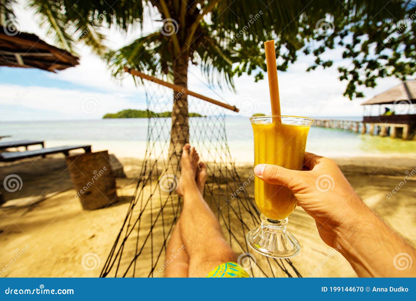 Man Drinks Mango Juice on the Beach Stock Photo - Image of paradise ...