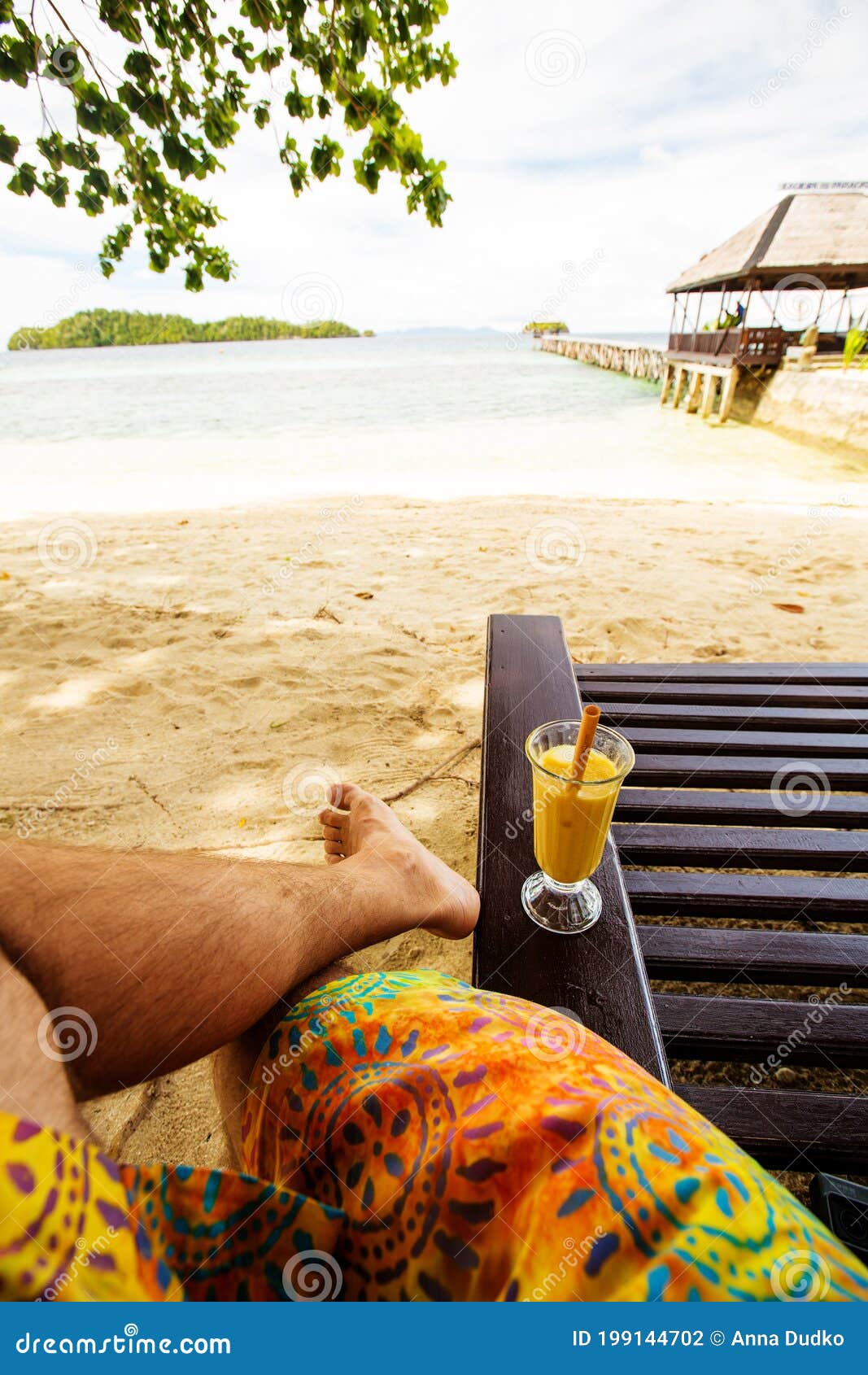 Man Drinks Mango Juice on the Beach Stock Photo - Image of drink, mango ...