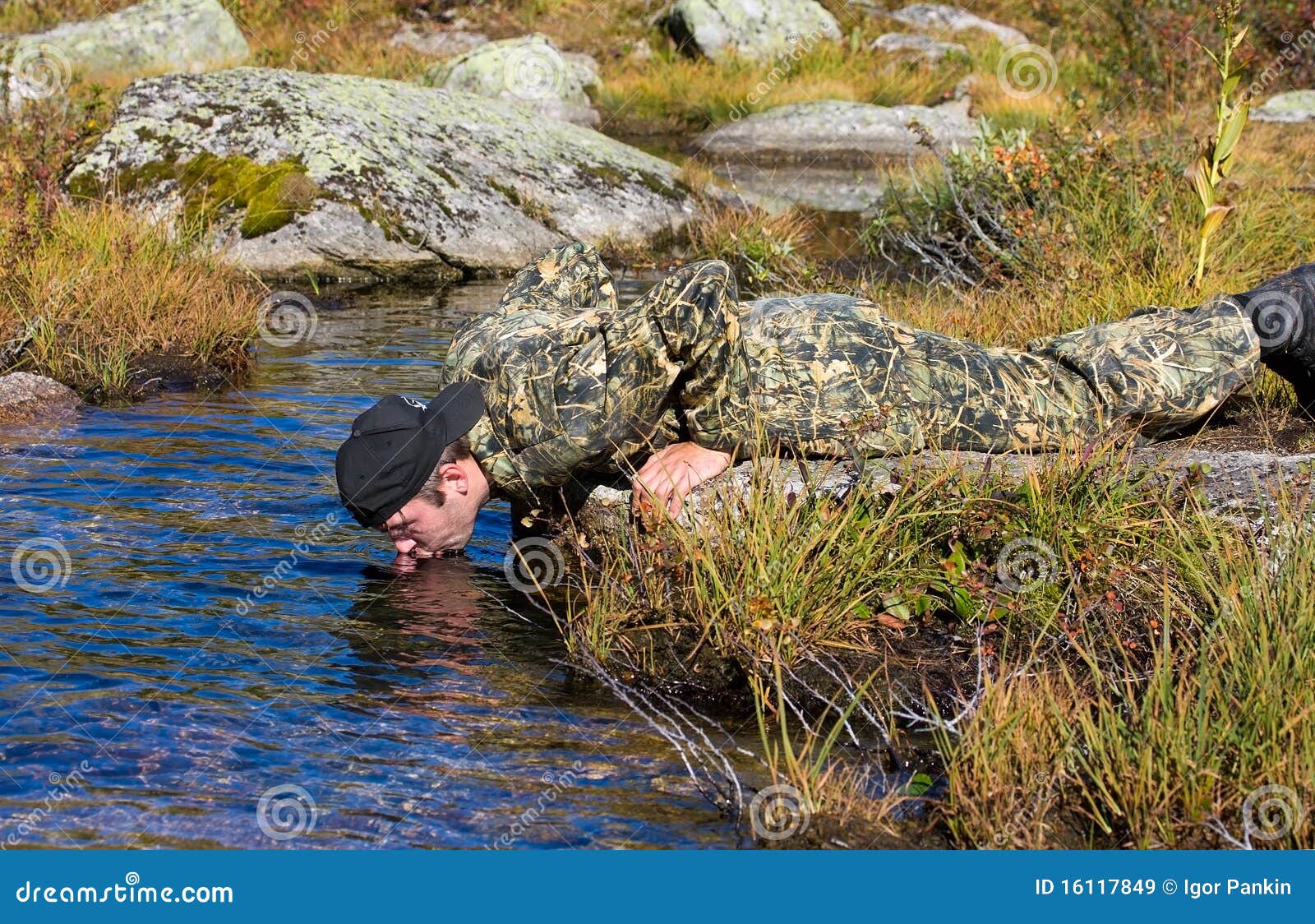 Man drinks water stock image. Image of park, leisure - 16117849