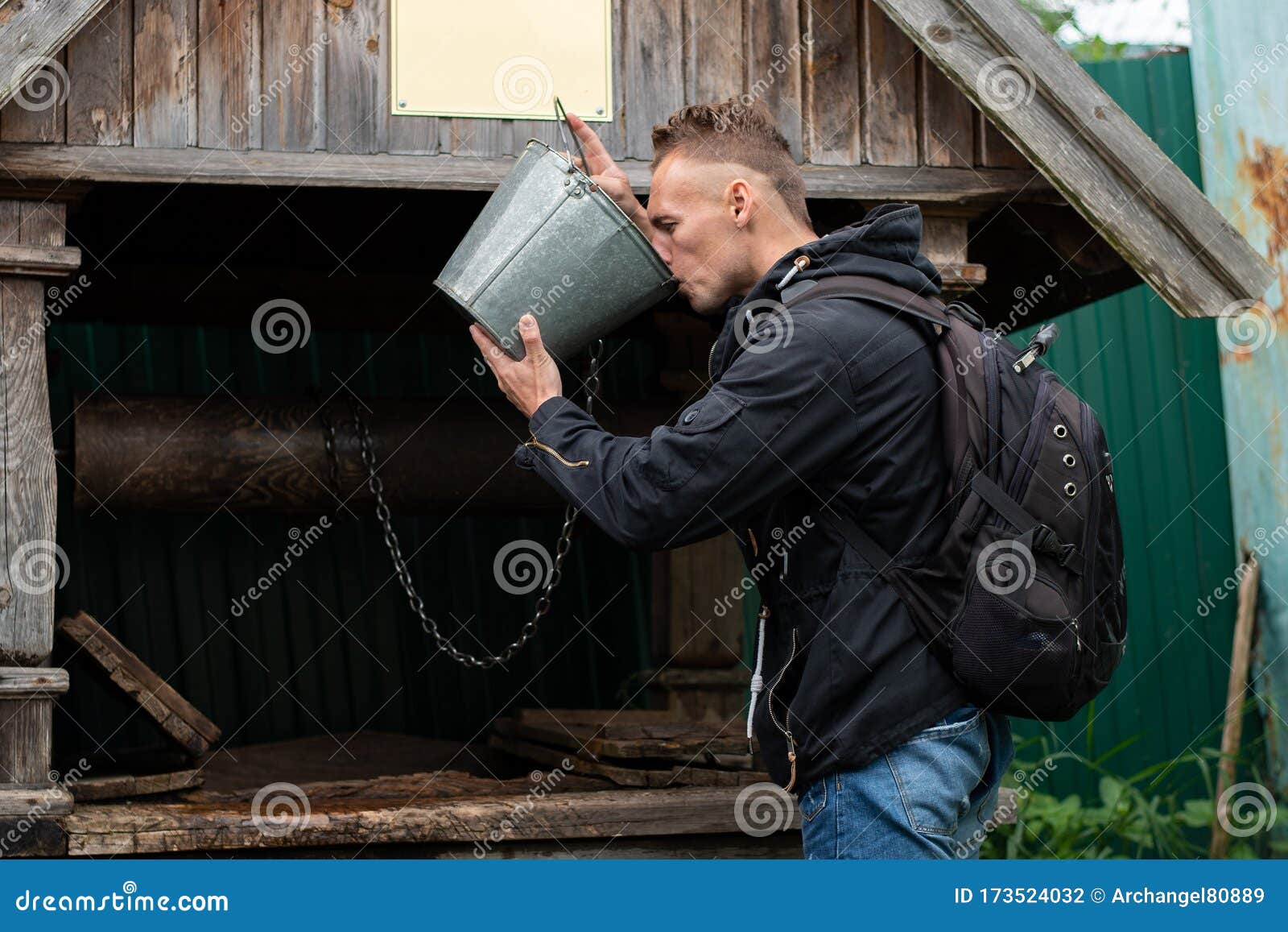 Man Drinks from Well with Water Stock Photo - Image of drinking, draw ...