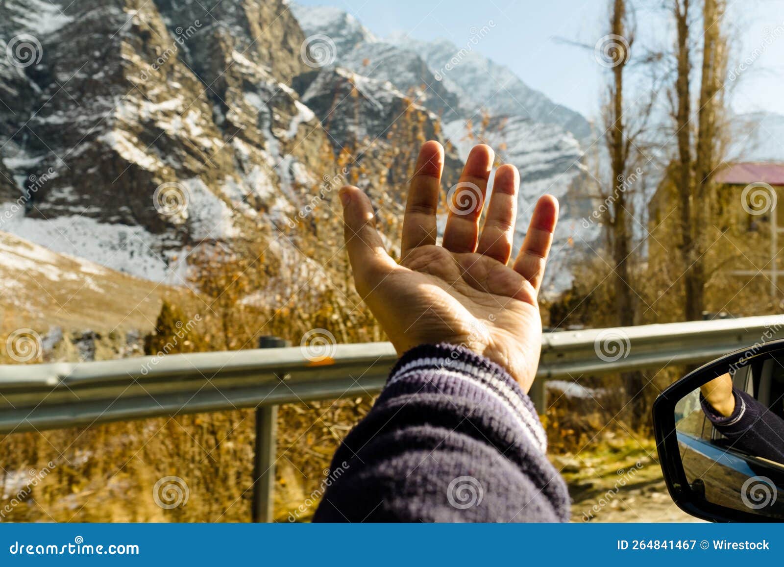 Man Driver Feeling the Wind through His Hands in the Countryside Stock ...