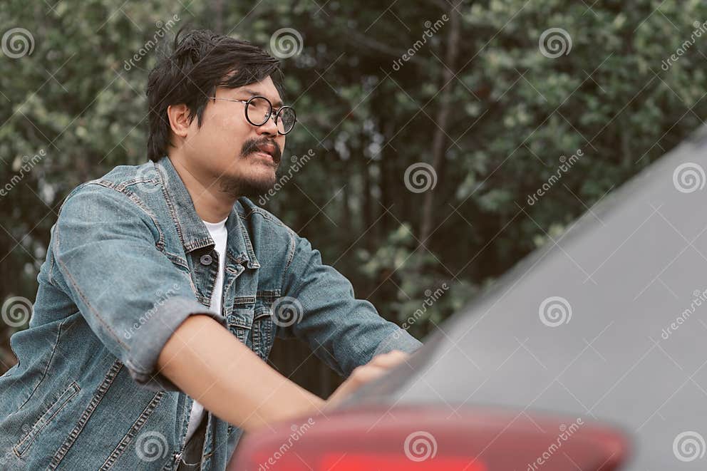 Man Driver is Pushing His Car after Car Breakdown. Stock Photo - Image ...