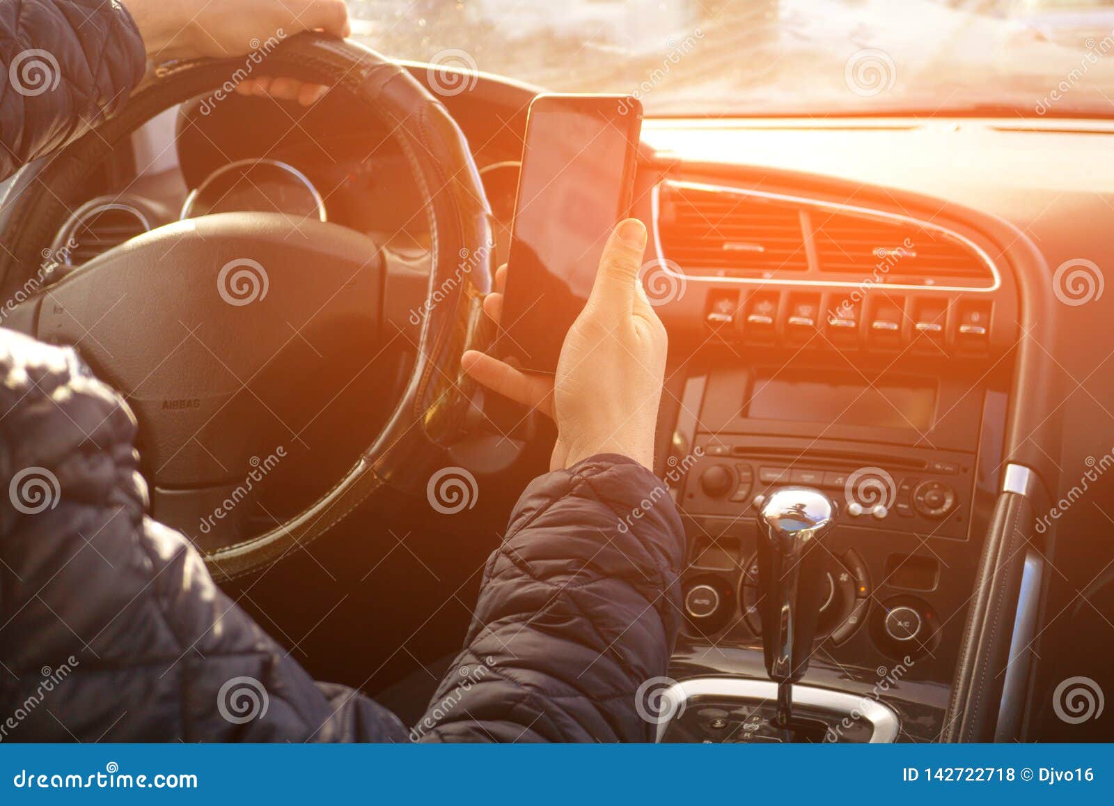 Man Driver Using Smart Phone in Car Stock Photo - Image of safety ...