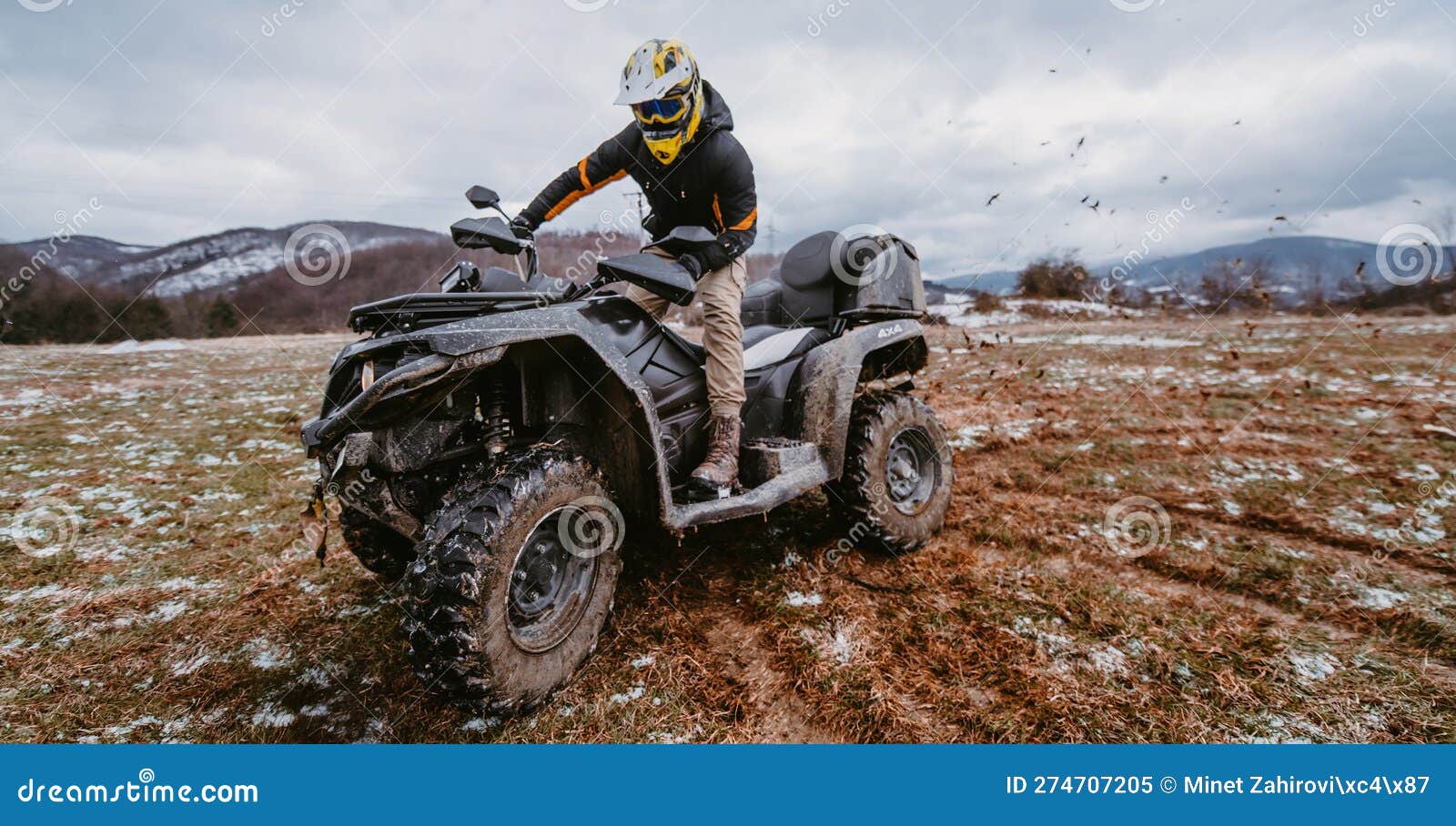 A Man Drives an ATV in the Mud. Drift Driving an ATV Quad in Mud and ...