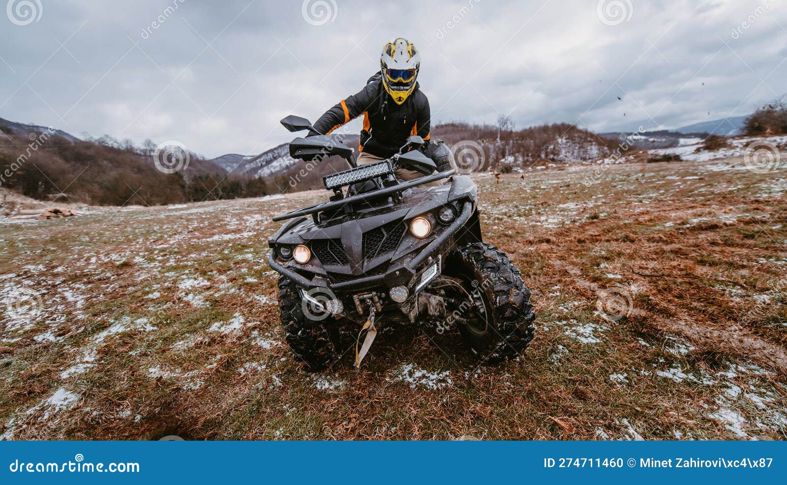 A Man Drives an ATV in the Mud. Drift Driving an ATV Quad in Mud and ...