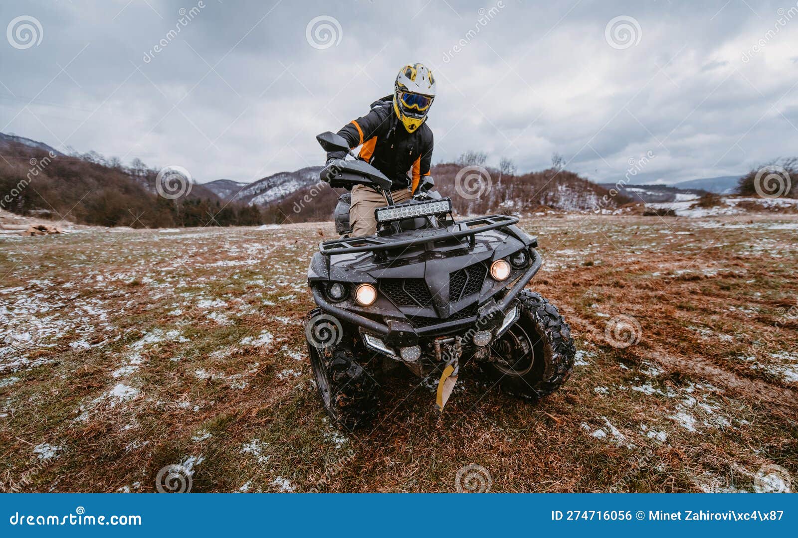 A Man Drives an ATV in the Mud. Drift Driving an ATV Quad in Mud and ...