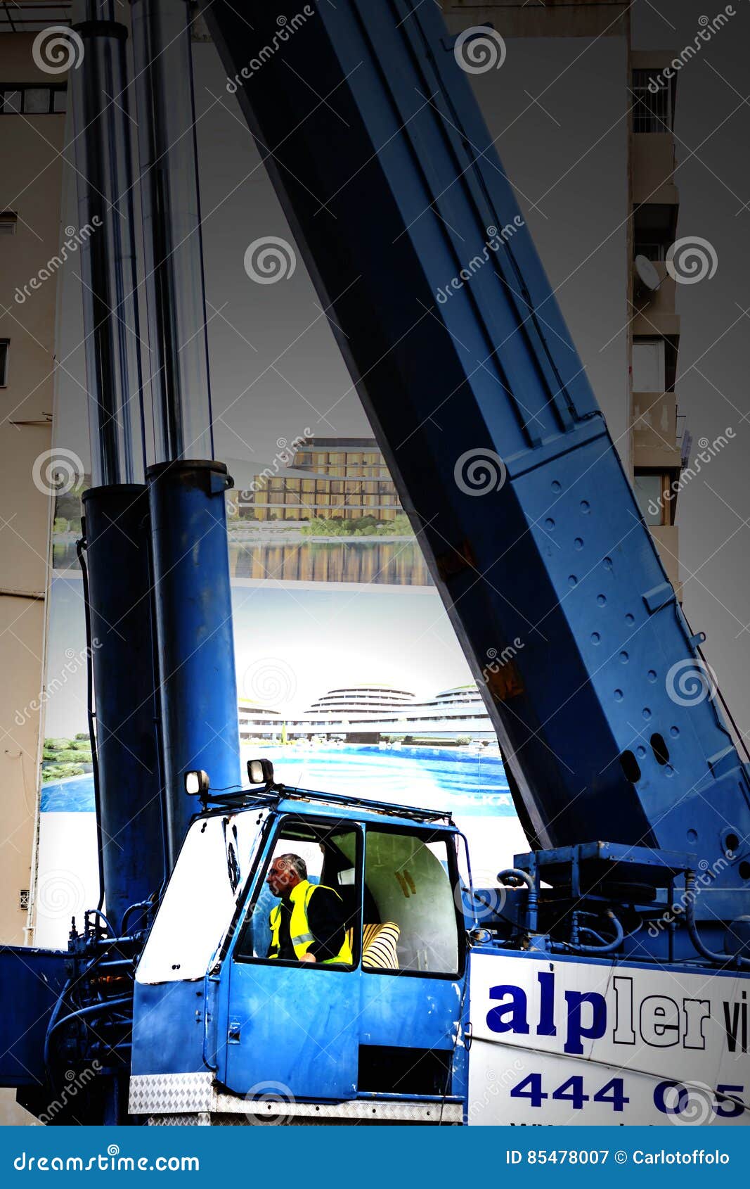 Man is driving a big crane editorial photography. Image of construction ...