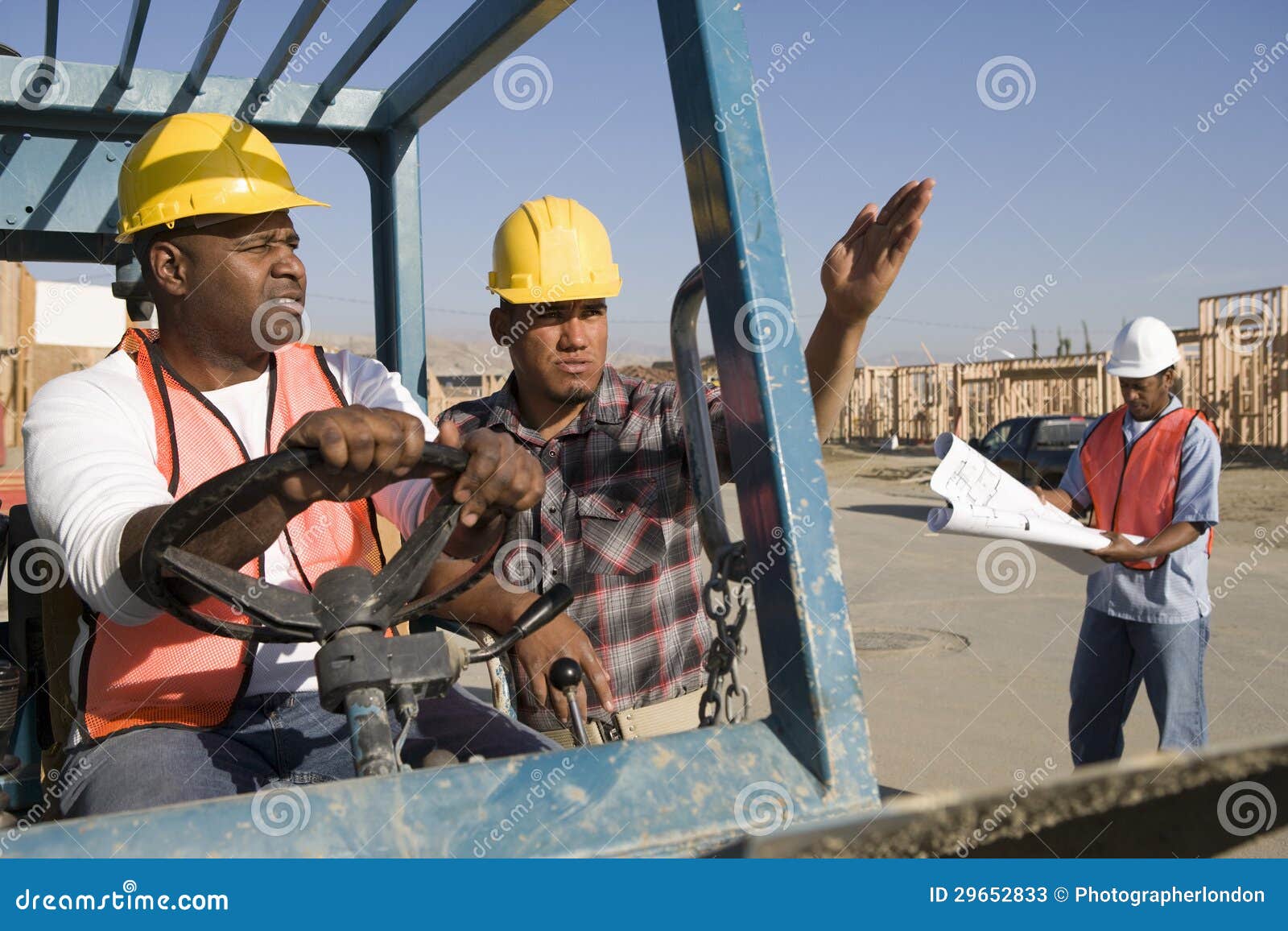 Man Driving Bulldozer with Co-Worker Stock Image - Image of ethnicity ...