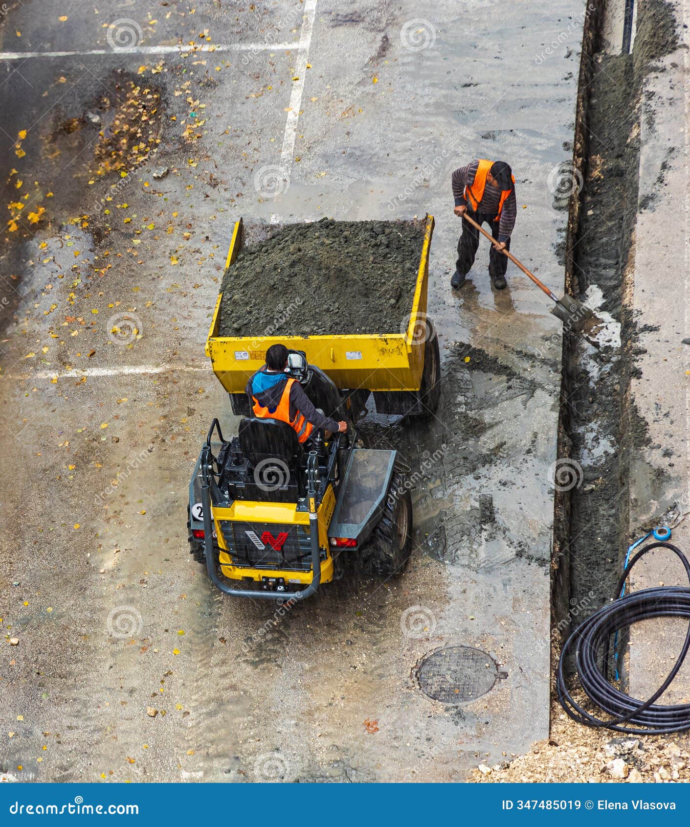Man Driving Bulldozer or Loader Moves the Earth at the Construction ...