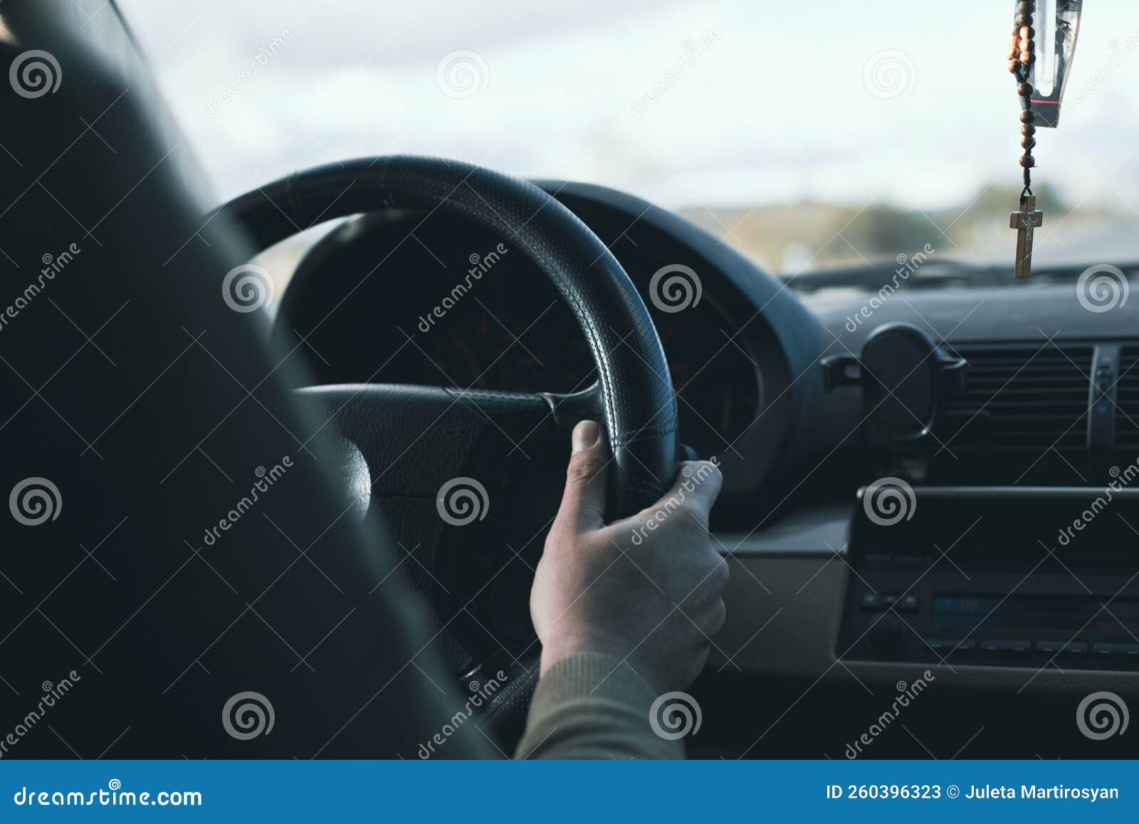 Man driving a car stock image. Image of street, hand - 260396323
