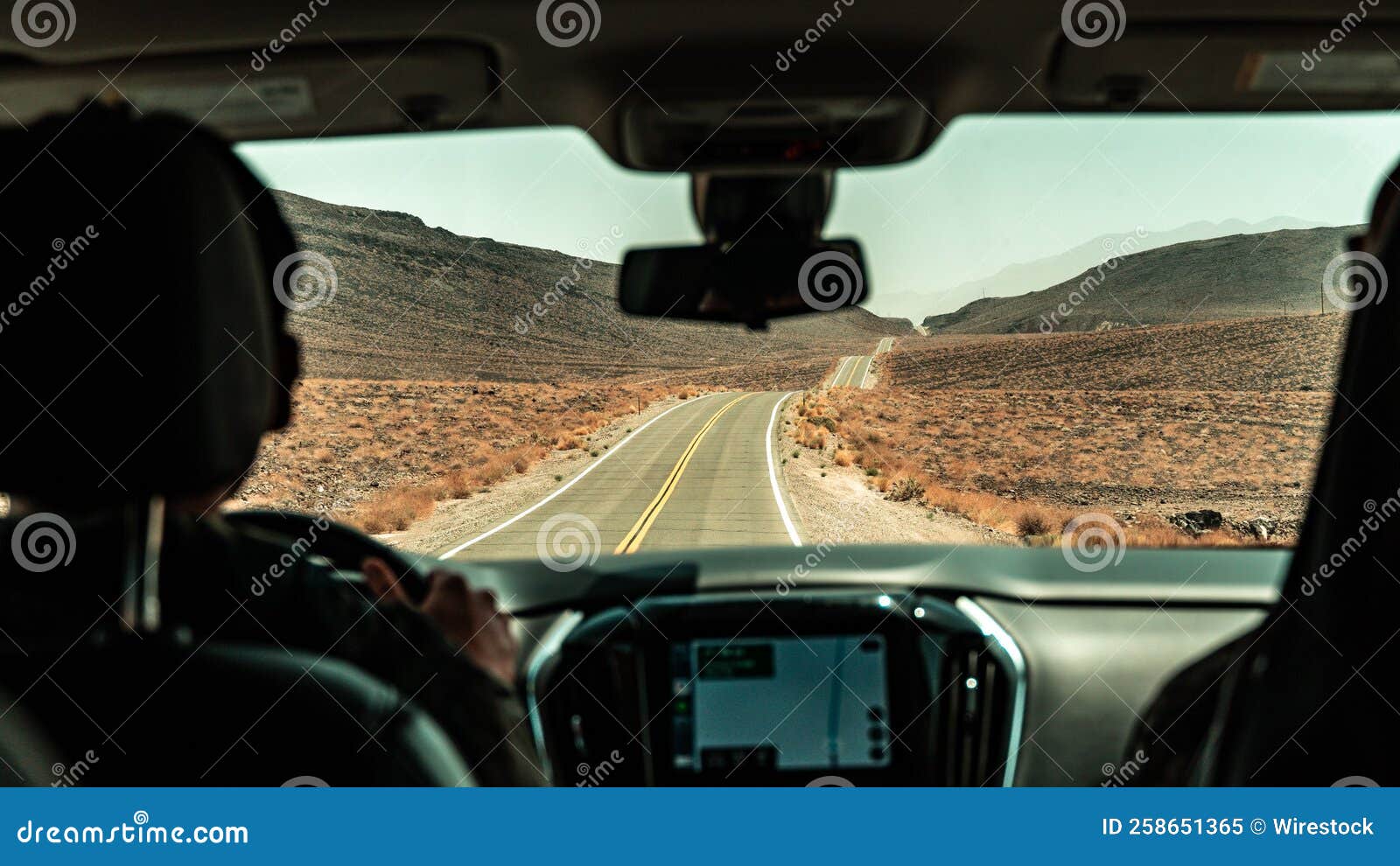 Man Driving a Car on an Empty Road in the Countryside Stock Image ...