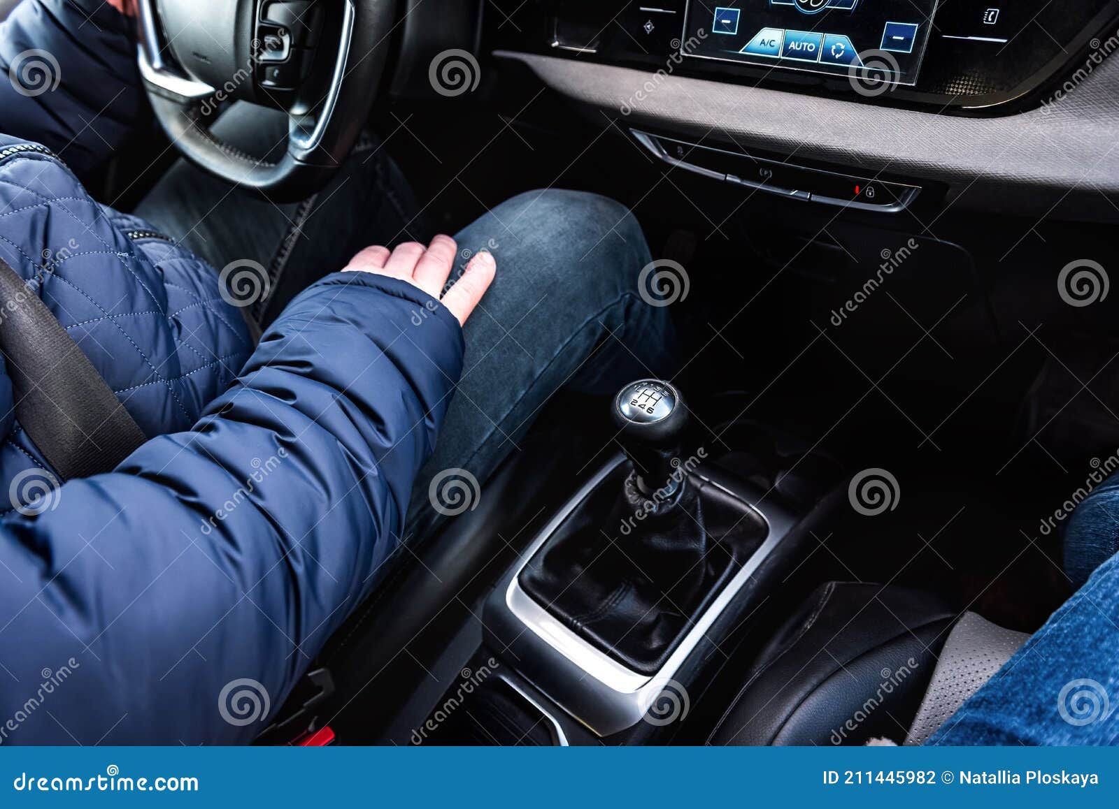 A Man Driving a Car with a Front View of the Road Stock Photo - Image ...
