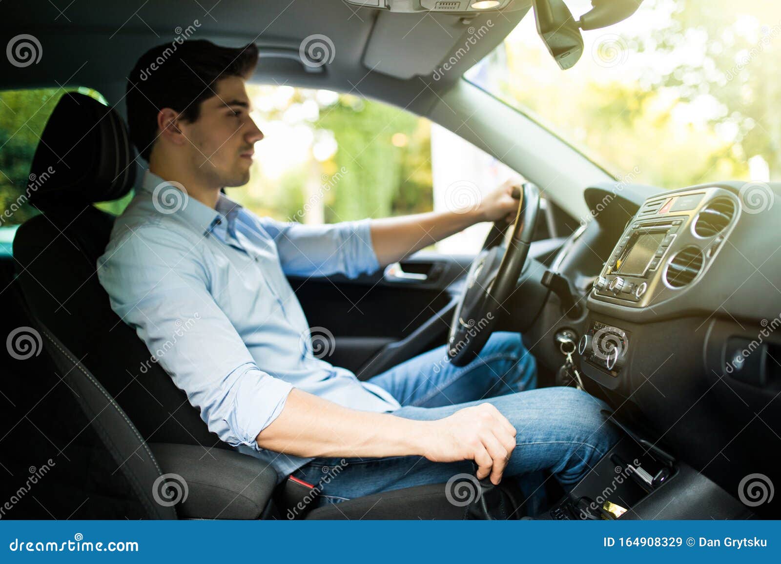Young Man Driving Car with Hand on Gearbox Stock Image - Image of ...