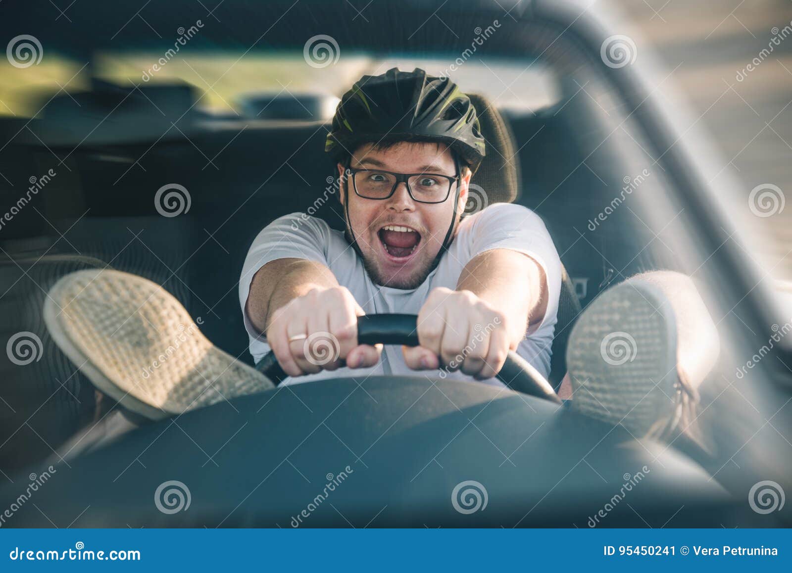 Man Driving Car in Helmet with Horror on Her Face Stock Image - Image ...