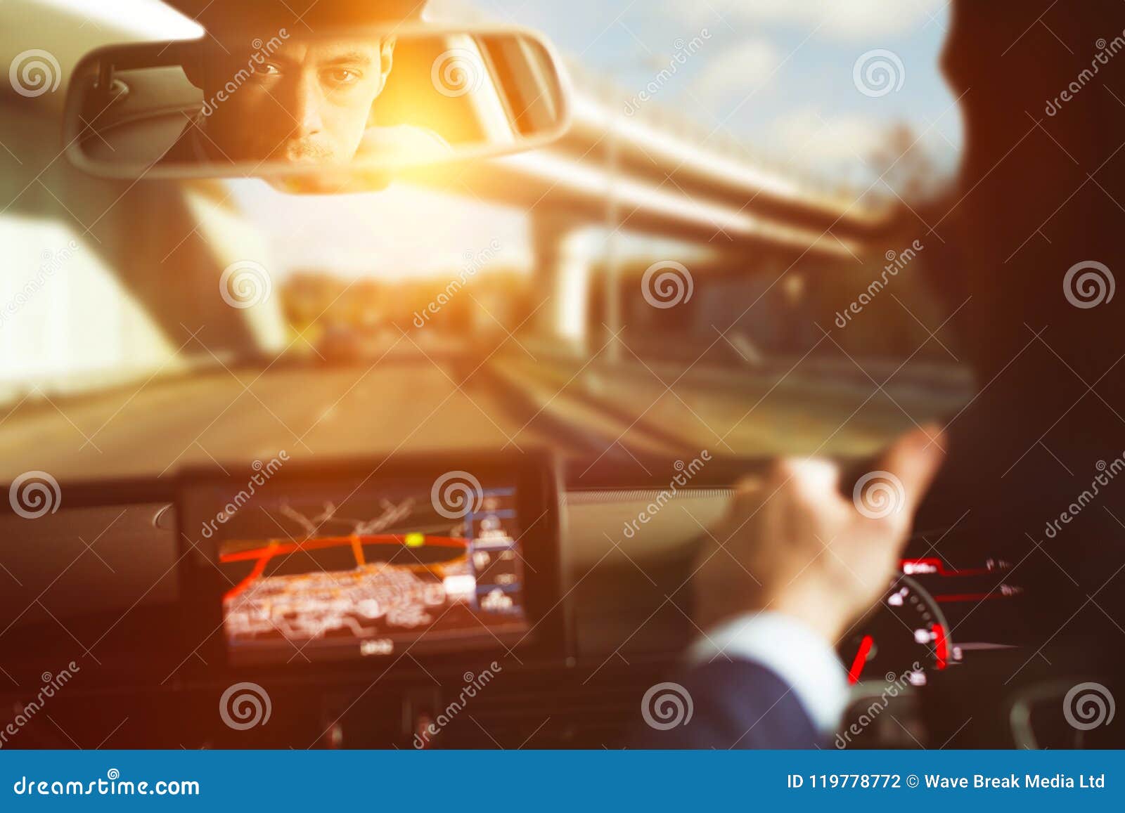 Man Driving Car and Looking into Rear View Stock Photo - Image of ...