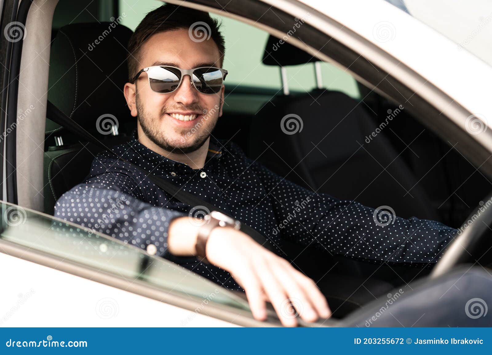 Man Driving a Car and Smiling Stock Photo - Image of navigation, road ...