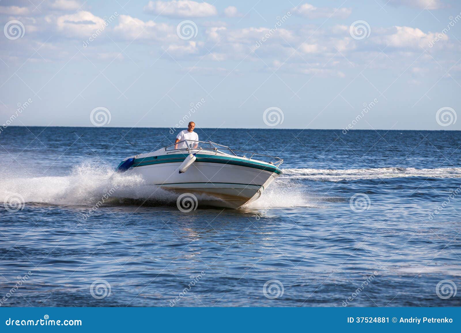 Man driving a fast boat stock image. Image of panning - 37524881