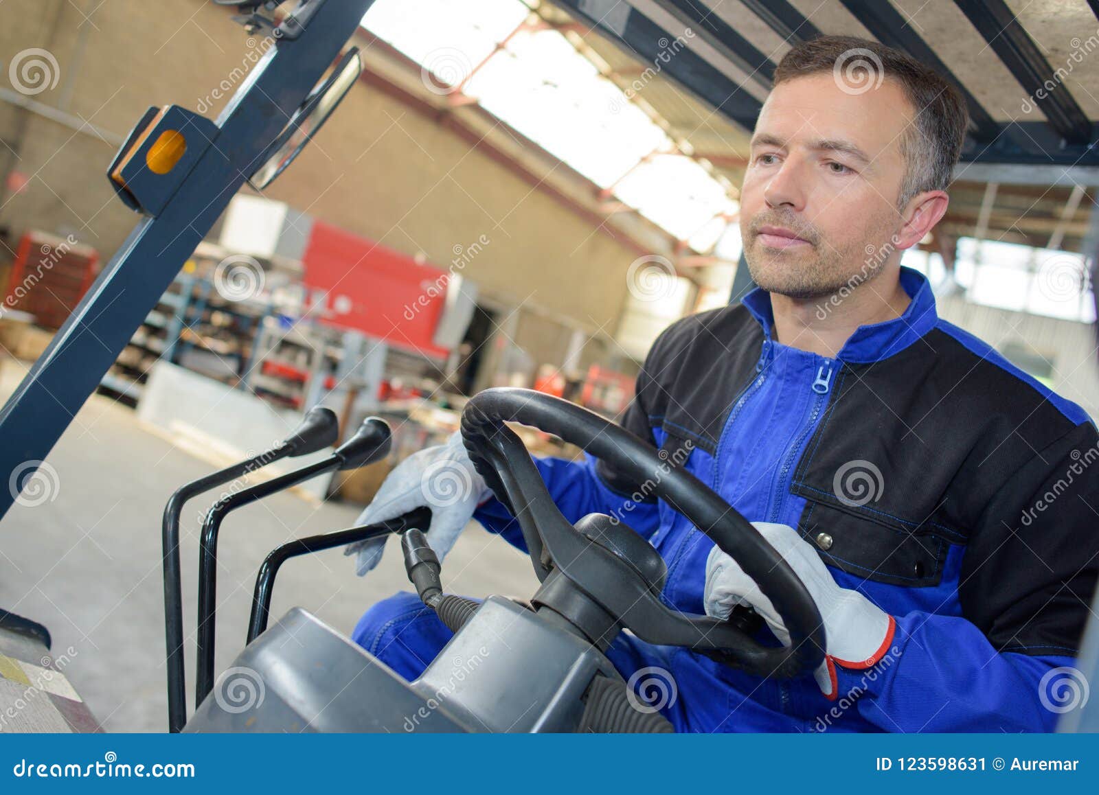 Man driving a forklift stock image. Image of young, driving - 123598631
