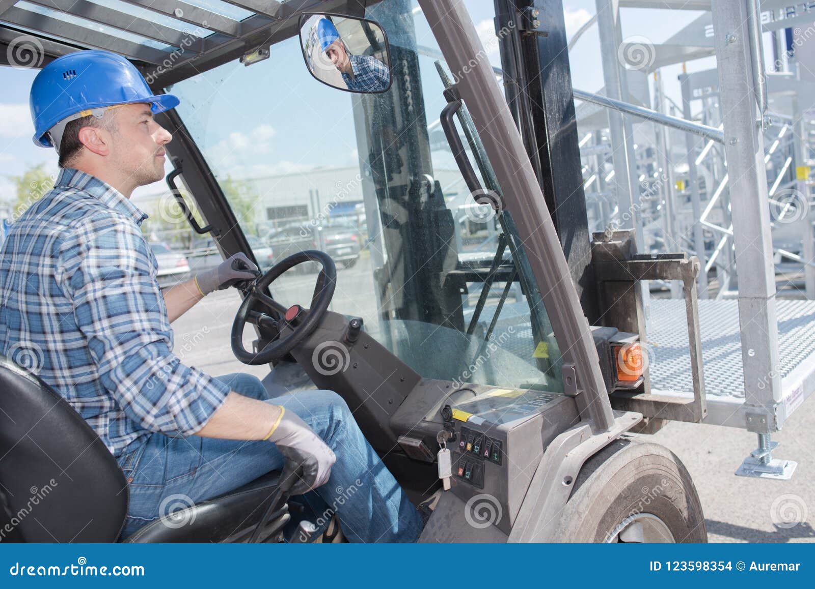 Man driving forklift truck stock photo. Image of carrier - 123598354