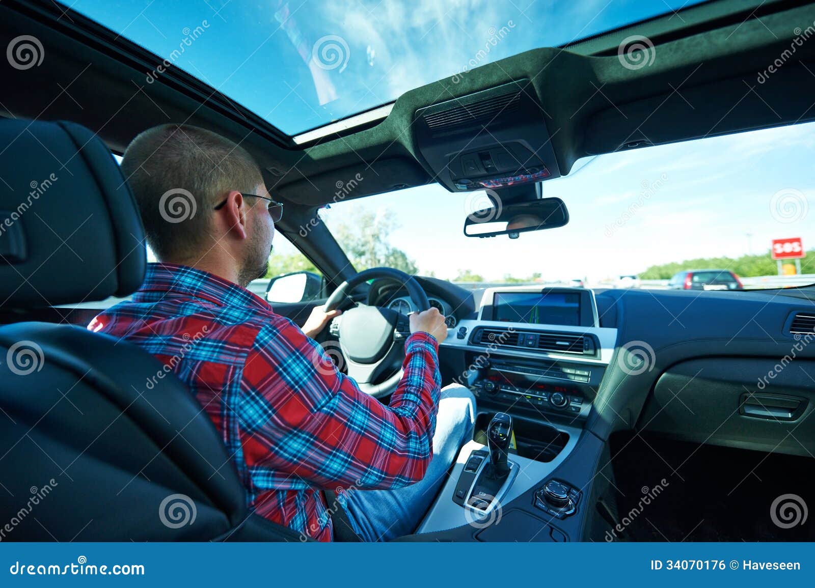 Man driving luxury car stock photo. Image of navi, wheel - 34070176