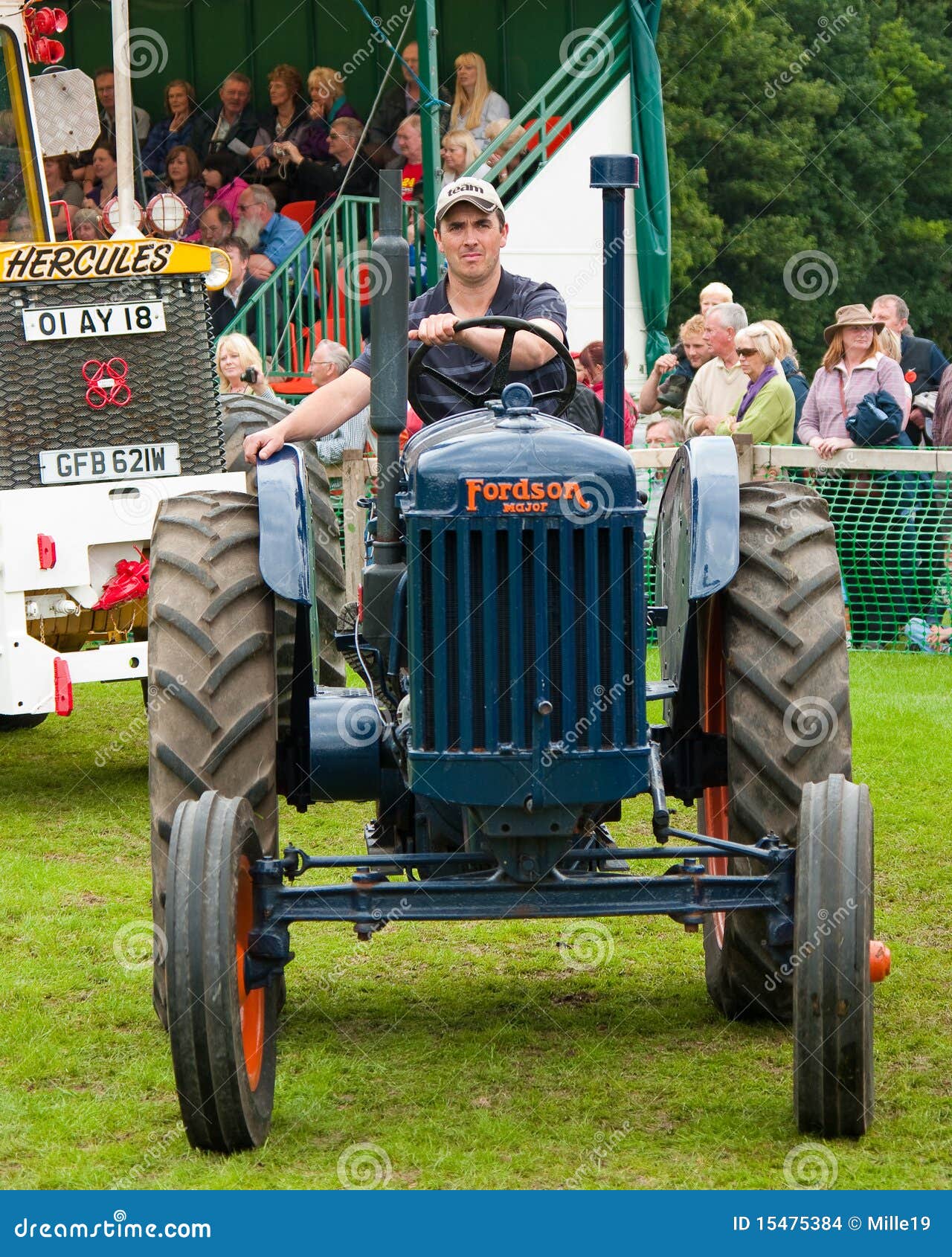 Man driving old Tractor editorial stock image. Image of tractor - 15475384