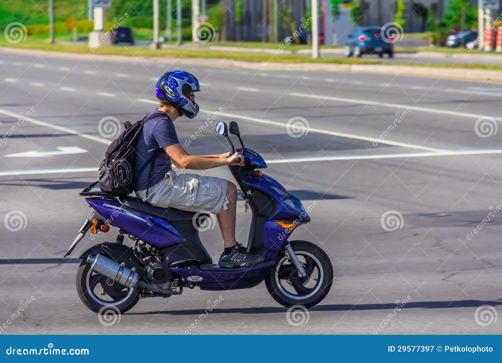 Man driving on a scooter editorial photography. Image of scooter - 29577397