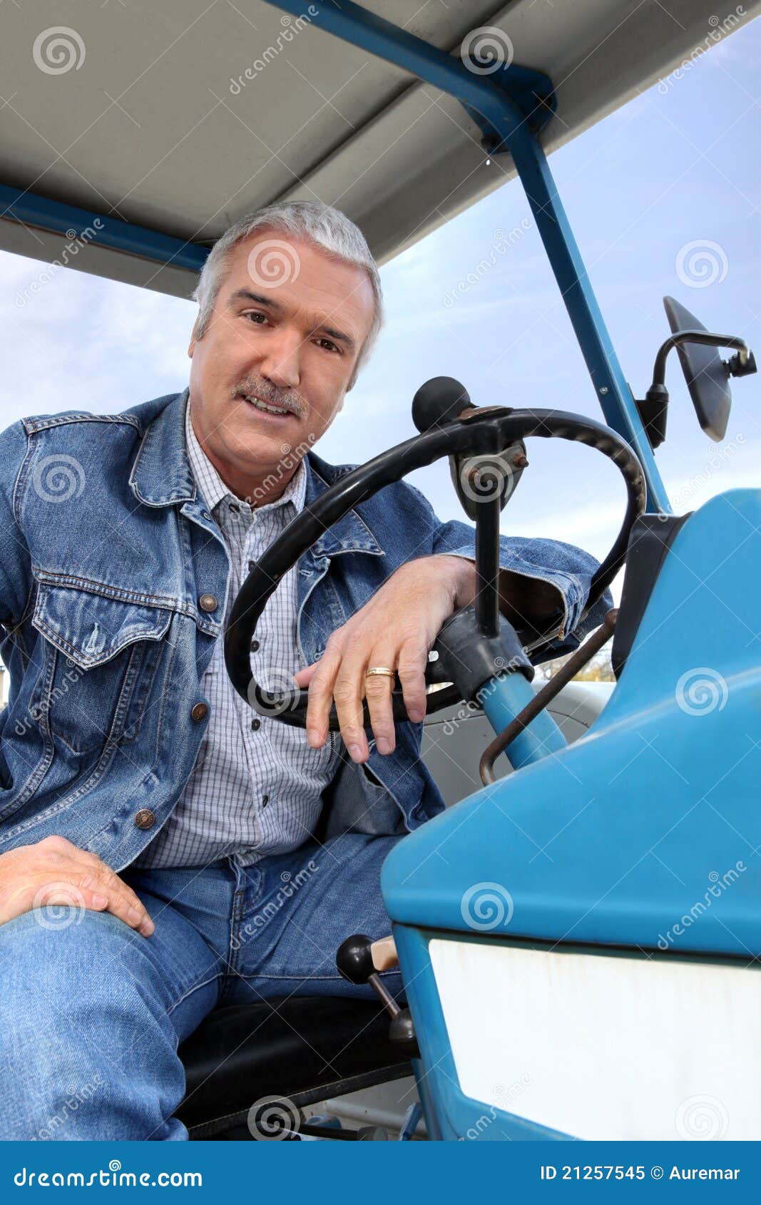 A man driving a tractor stock image. Image of handling - 21257545