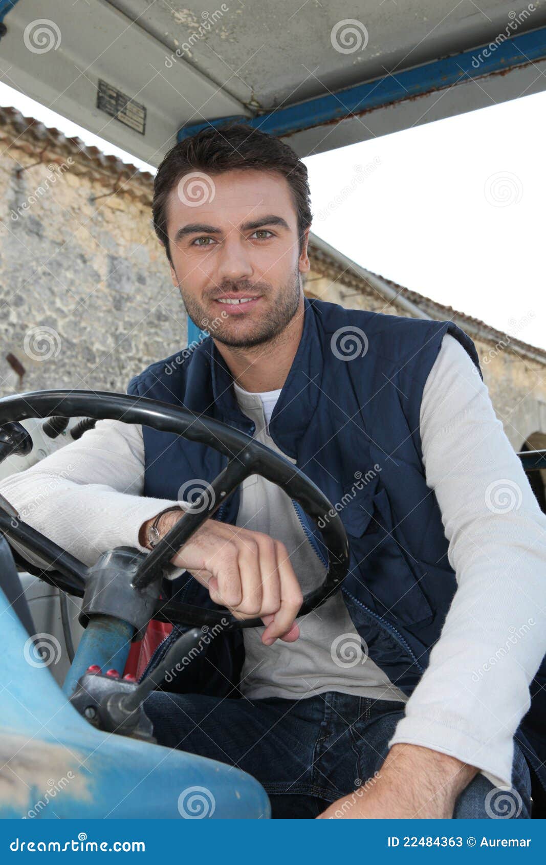 Man driving a tractor stock image. Image of friendly - 22484363