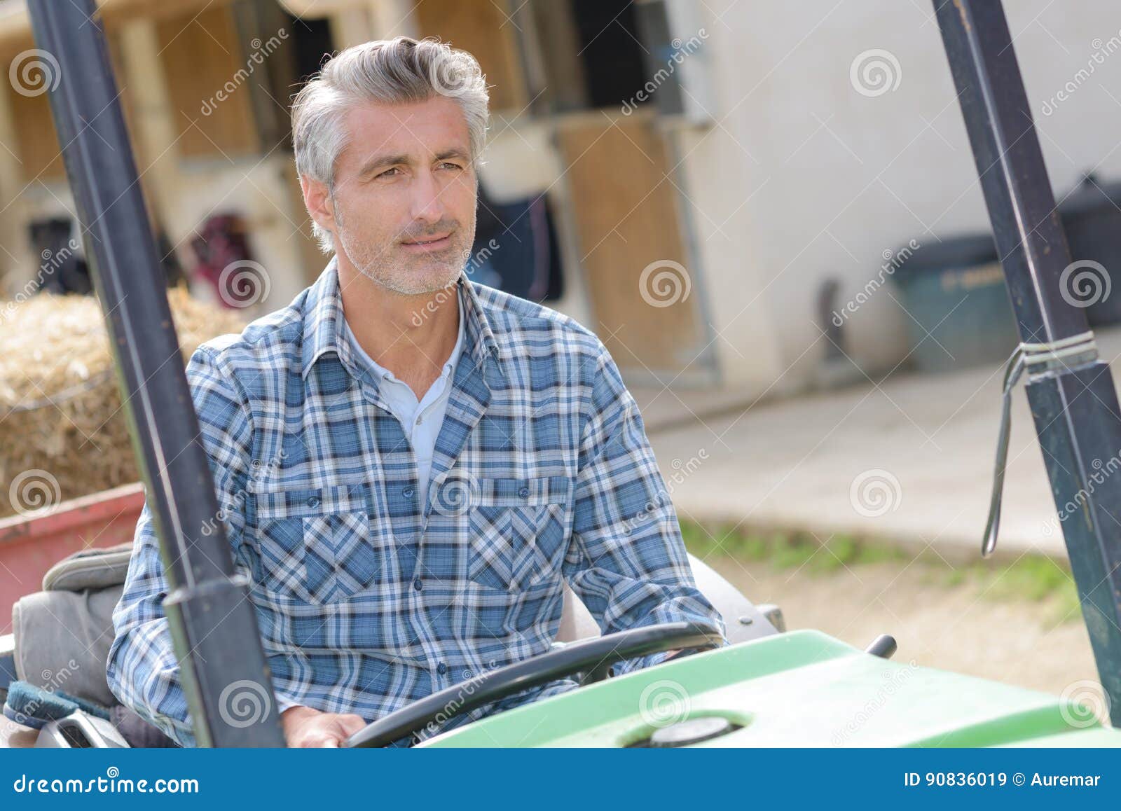 Man Driving Tractor at Riding Centre Stock Image - Image of equestrian ...