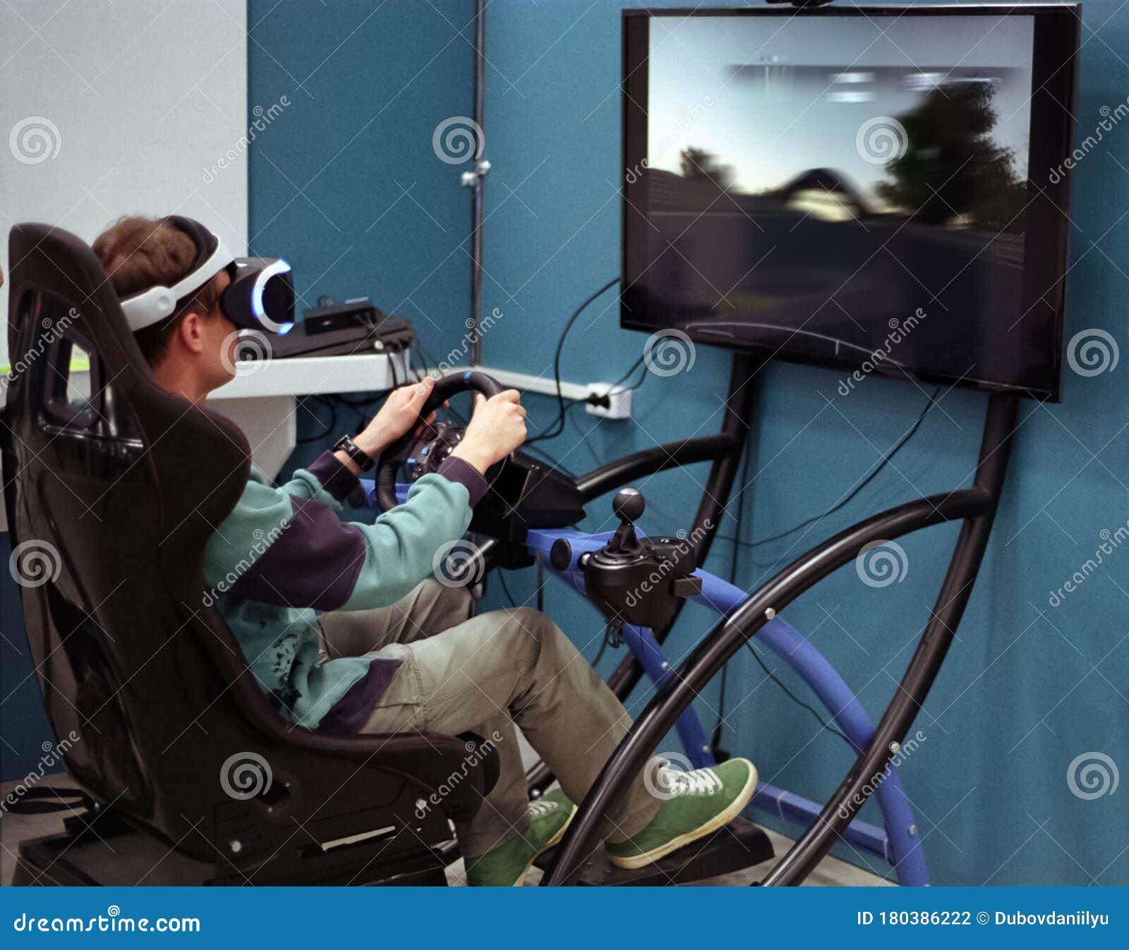 Man Driving a Virtual Machine with Virtual Reality Glasses, Augmented ...
