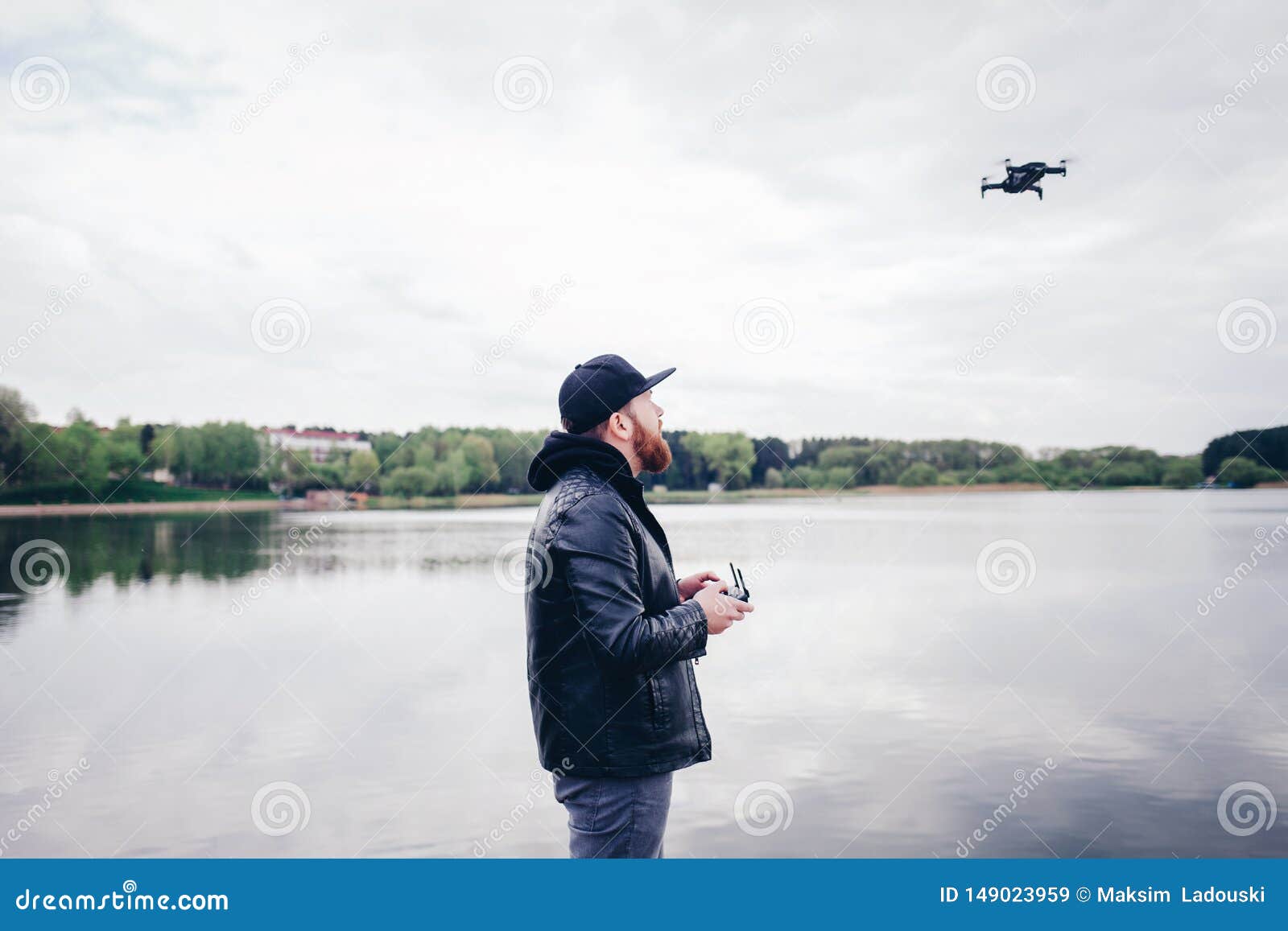 Man with drone with camera stock image. Image of house - 149023959