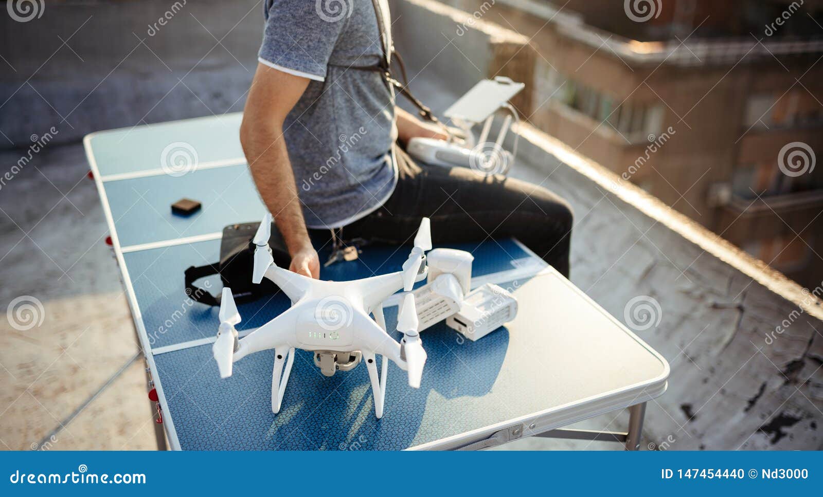 Man with Drone Flying at the City on Rooftop Stock Photo - Image of ...