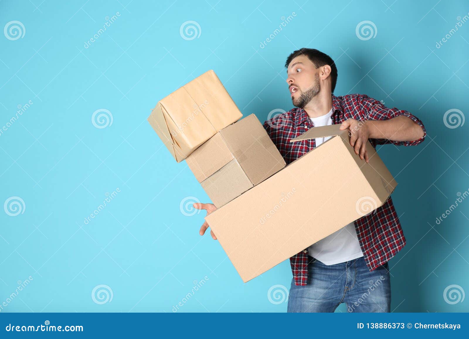 Man Dropping Moving Boxes on Color Background. Stock Image - Image of ...