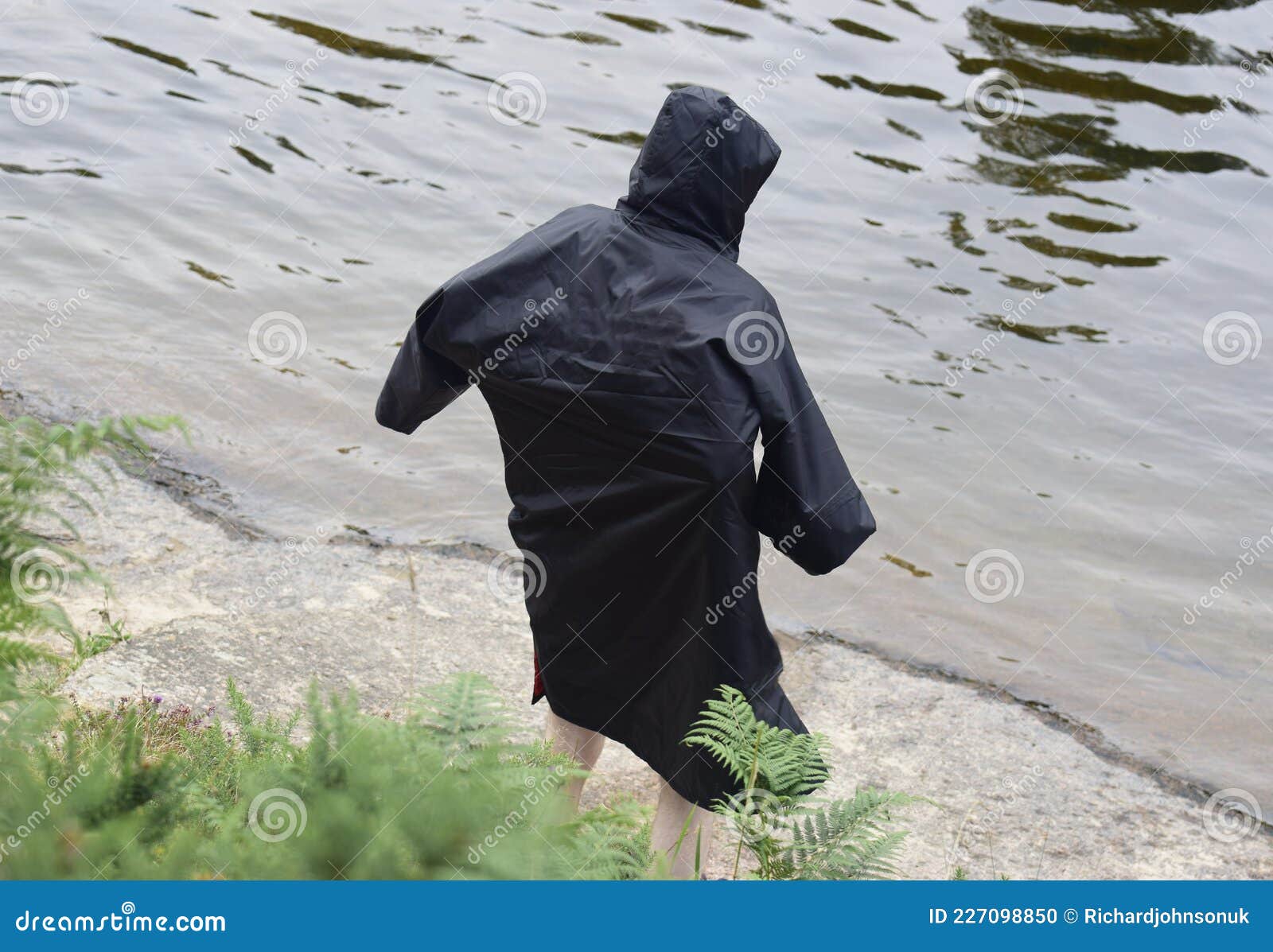 Man in Dry Changing Robe after Wild Swim Outdoors Stock Photo - Image ...