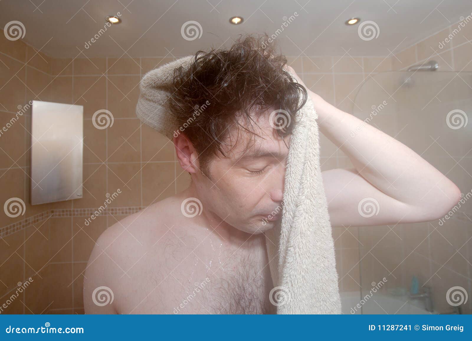 A Man Drying Himself stock image. Image of messy, towel - 11287241