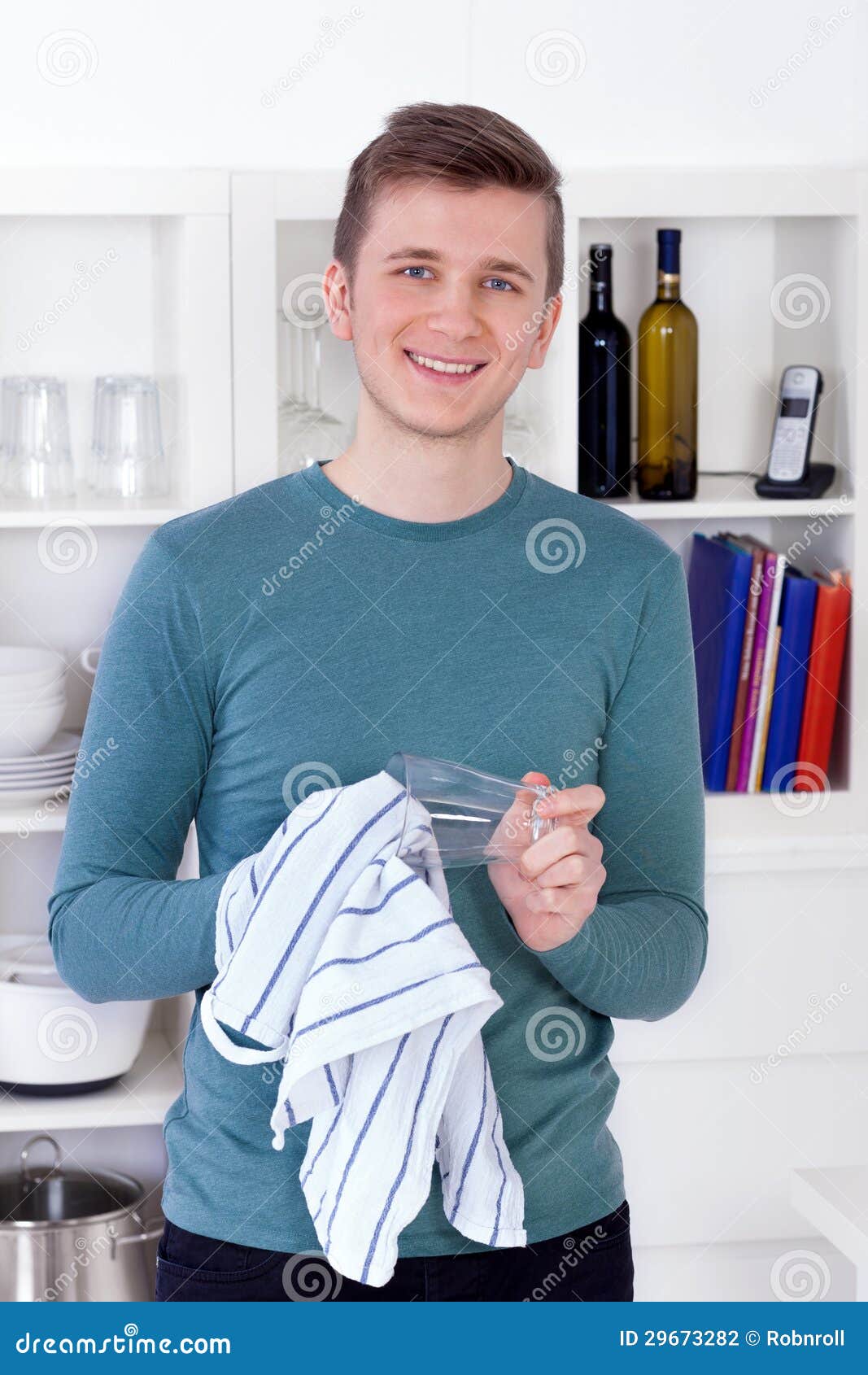 Man Drying and Polishing Glass with a Kitchen Towel Stock Photo - Image ...