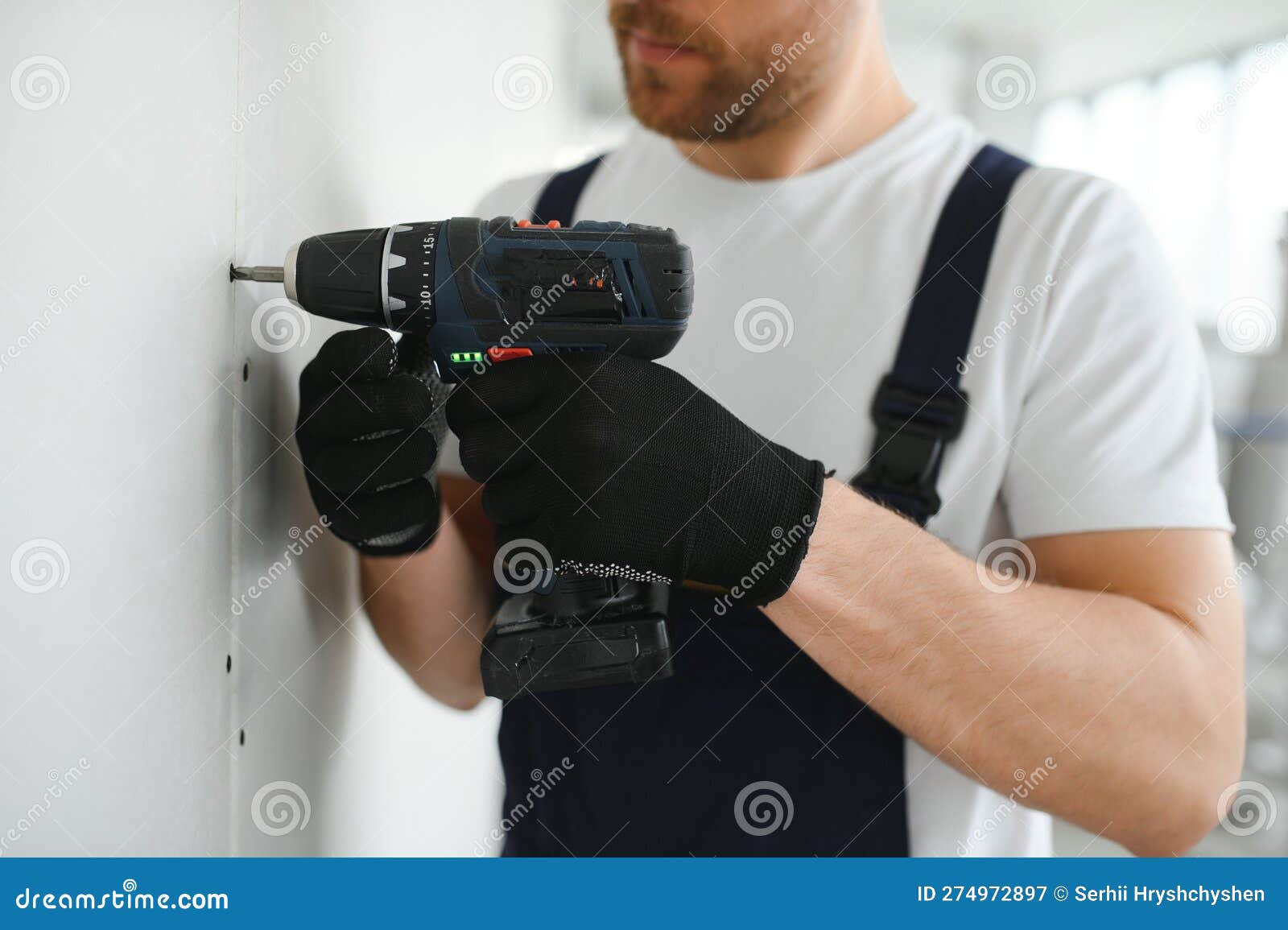 Man Drywall Worker Installing Plasterboard Sheet To Wall. Stock Image ...